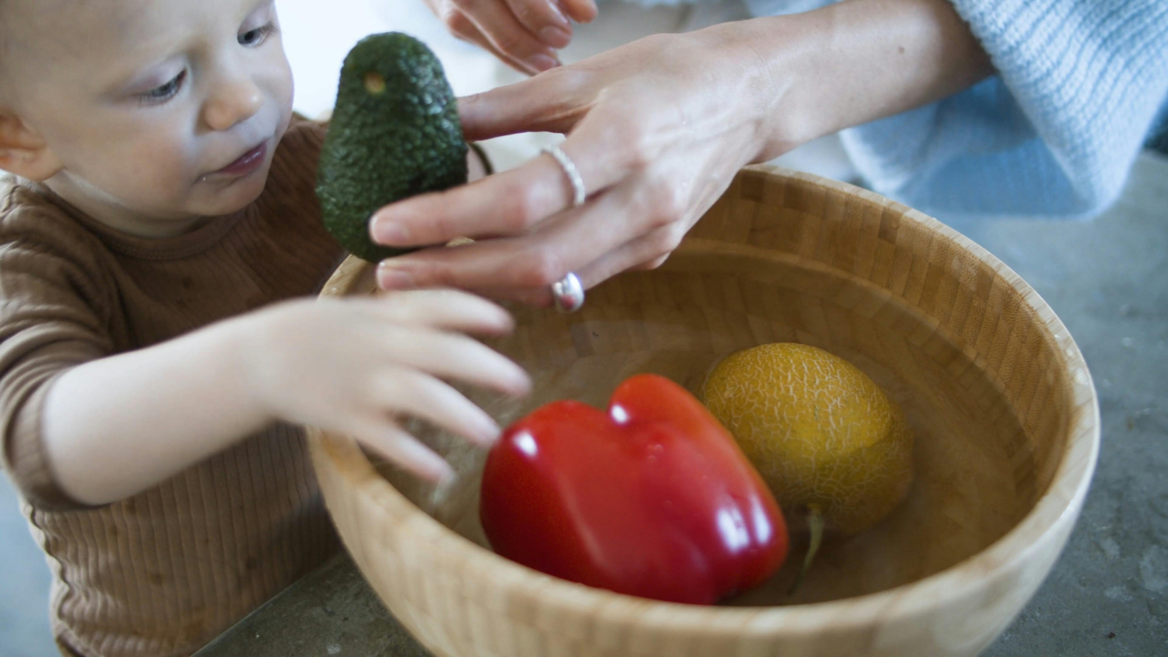 Close-Up View of a Baby Helping Her Parent Free Stock Video Footage ...