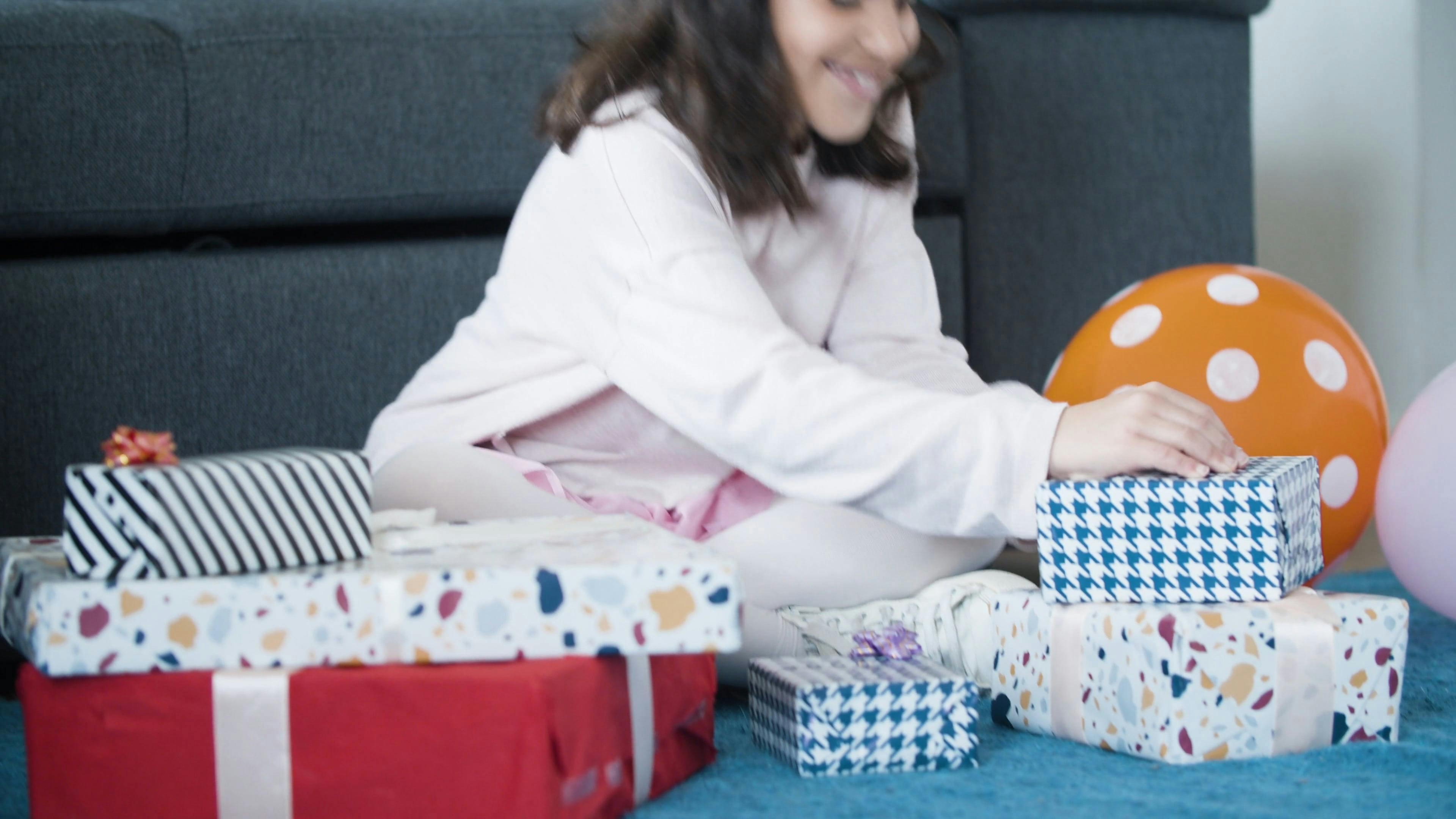 Person Opening Gift · Free Stock Video