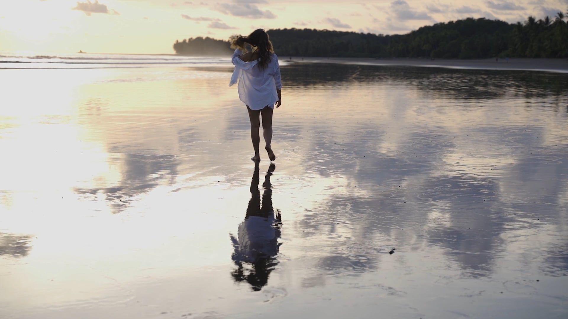 Slow Motion Video of a Woman Walking on Shoreline Free Stock Video ...