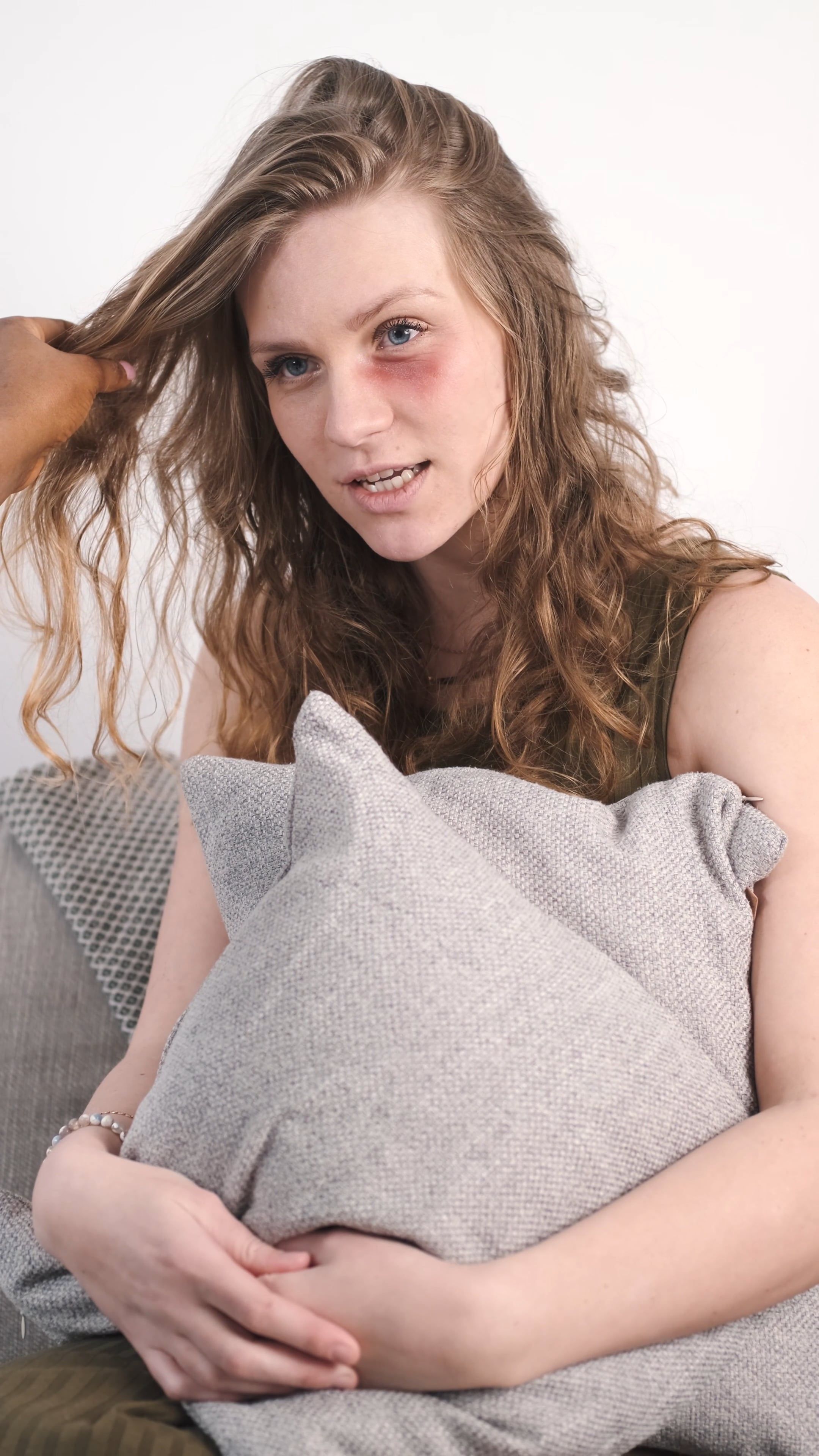 A Bruised Woman Touching her Face · Free Stock Video
