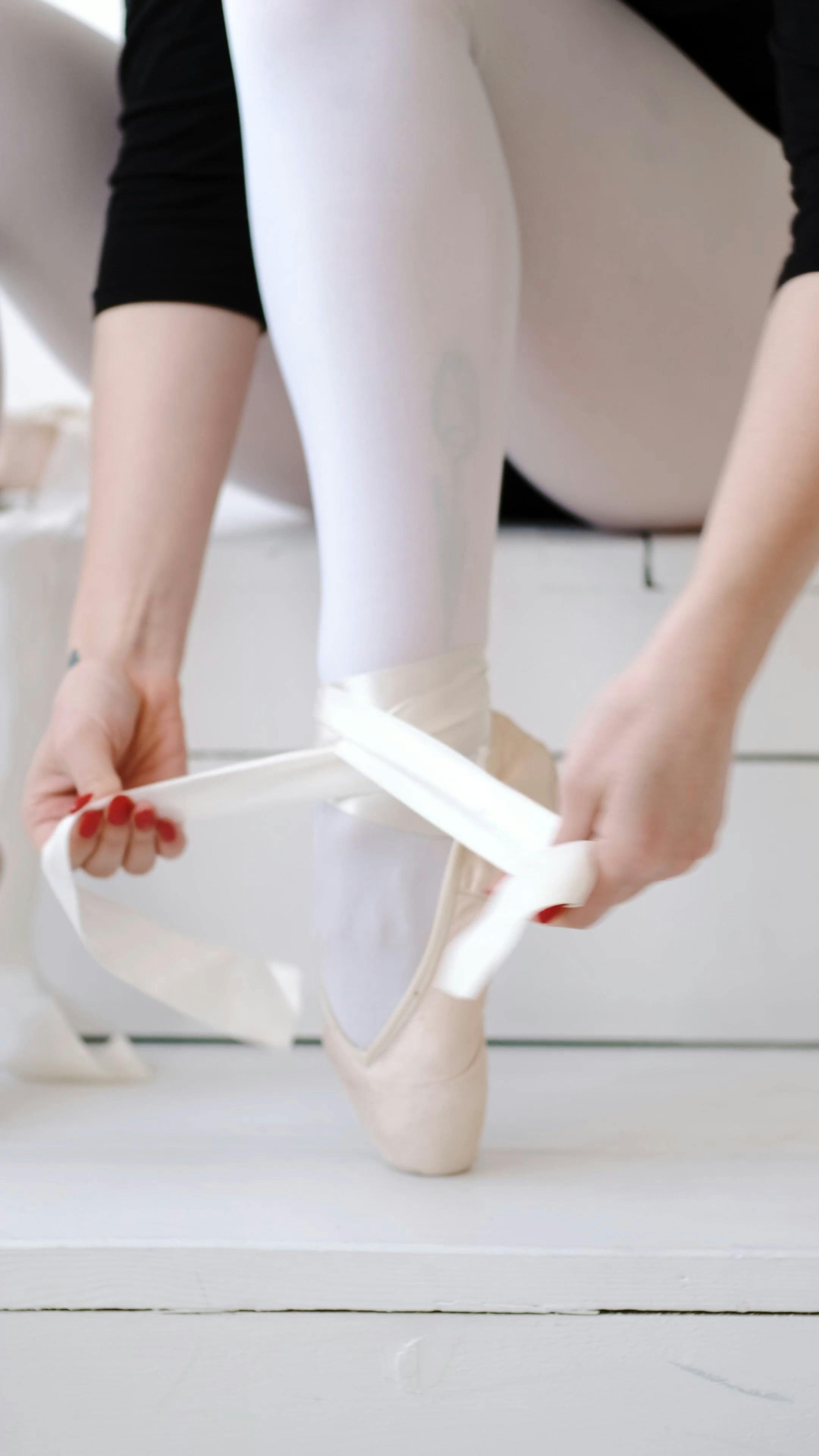 A Ballerina Wearing Her Pointe Shoes · Free Stock Video