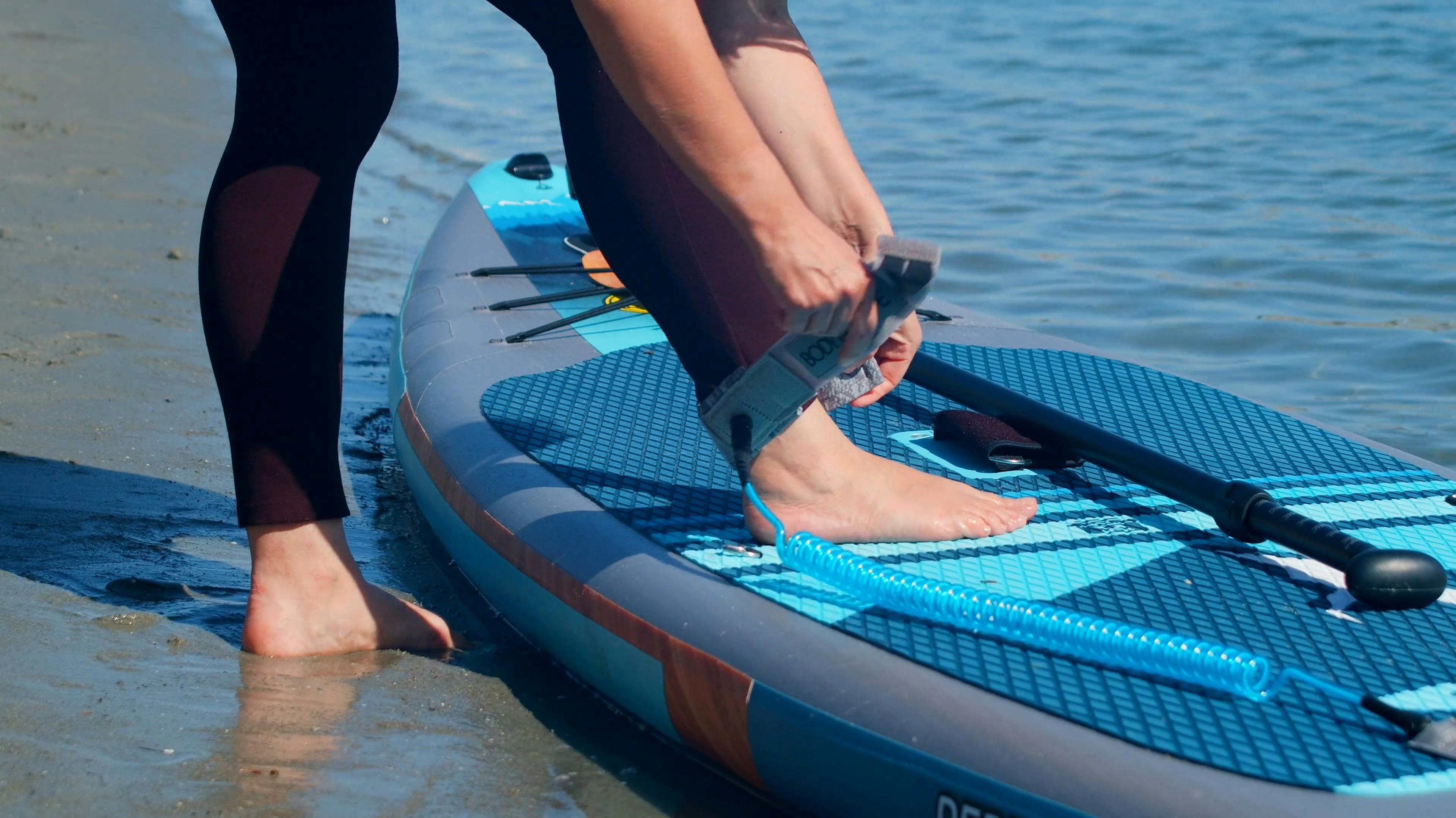 A Person Riding a Paddle Board · Free Stock Video