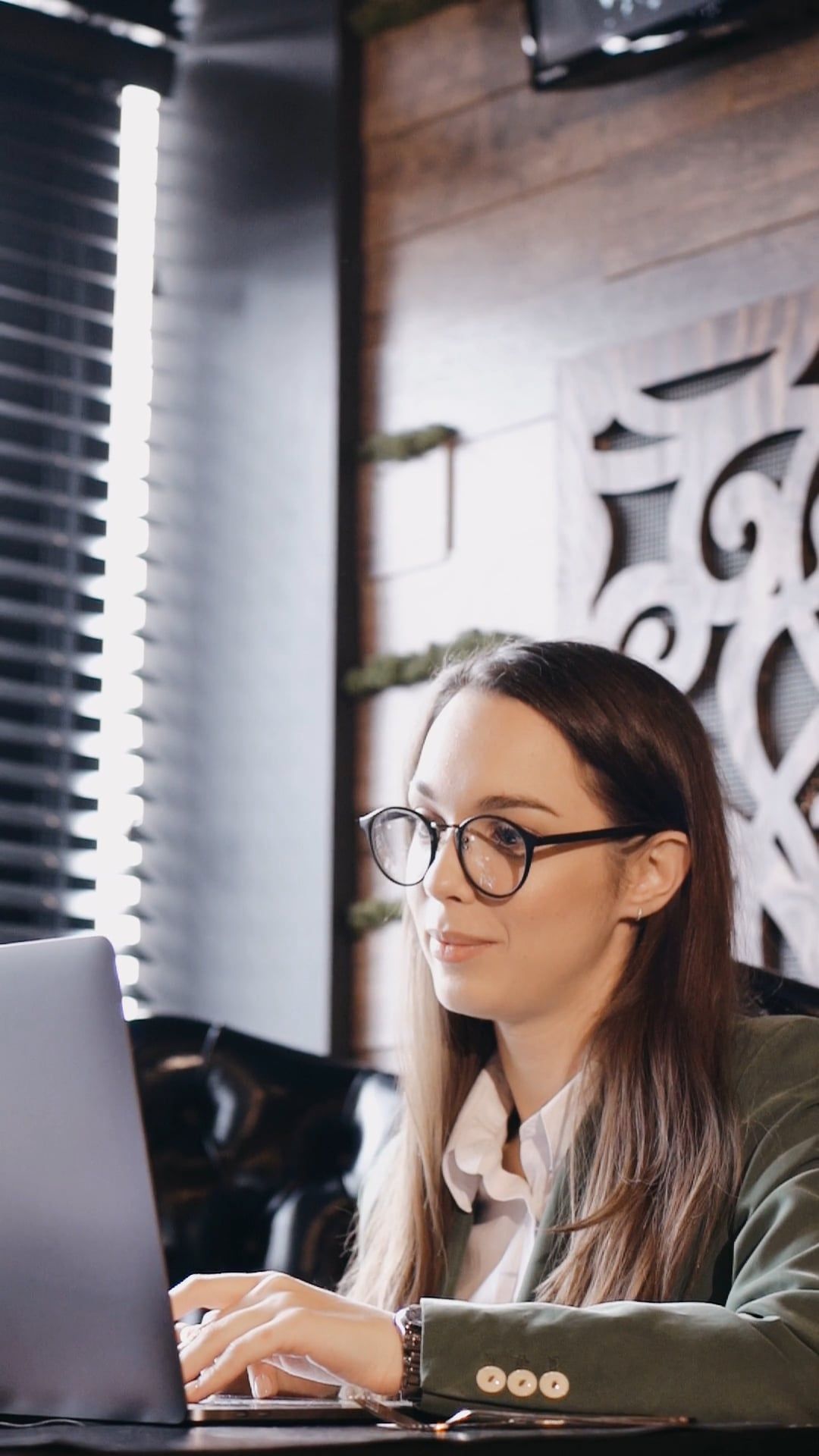 Beautiful Woman Using a Laptop · Free Stock Video