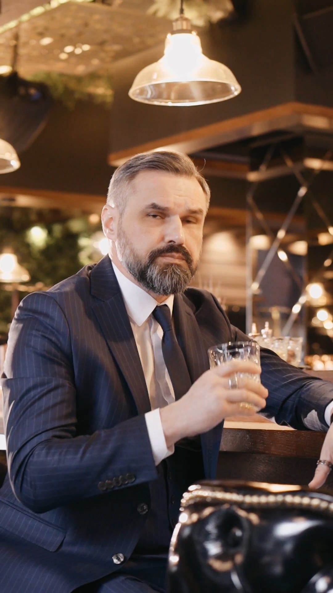 Businessman Drinking Whiskey at the Bar Counter of a Hotel Lounge ...