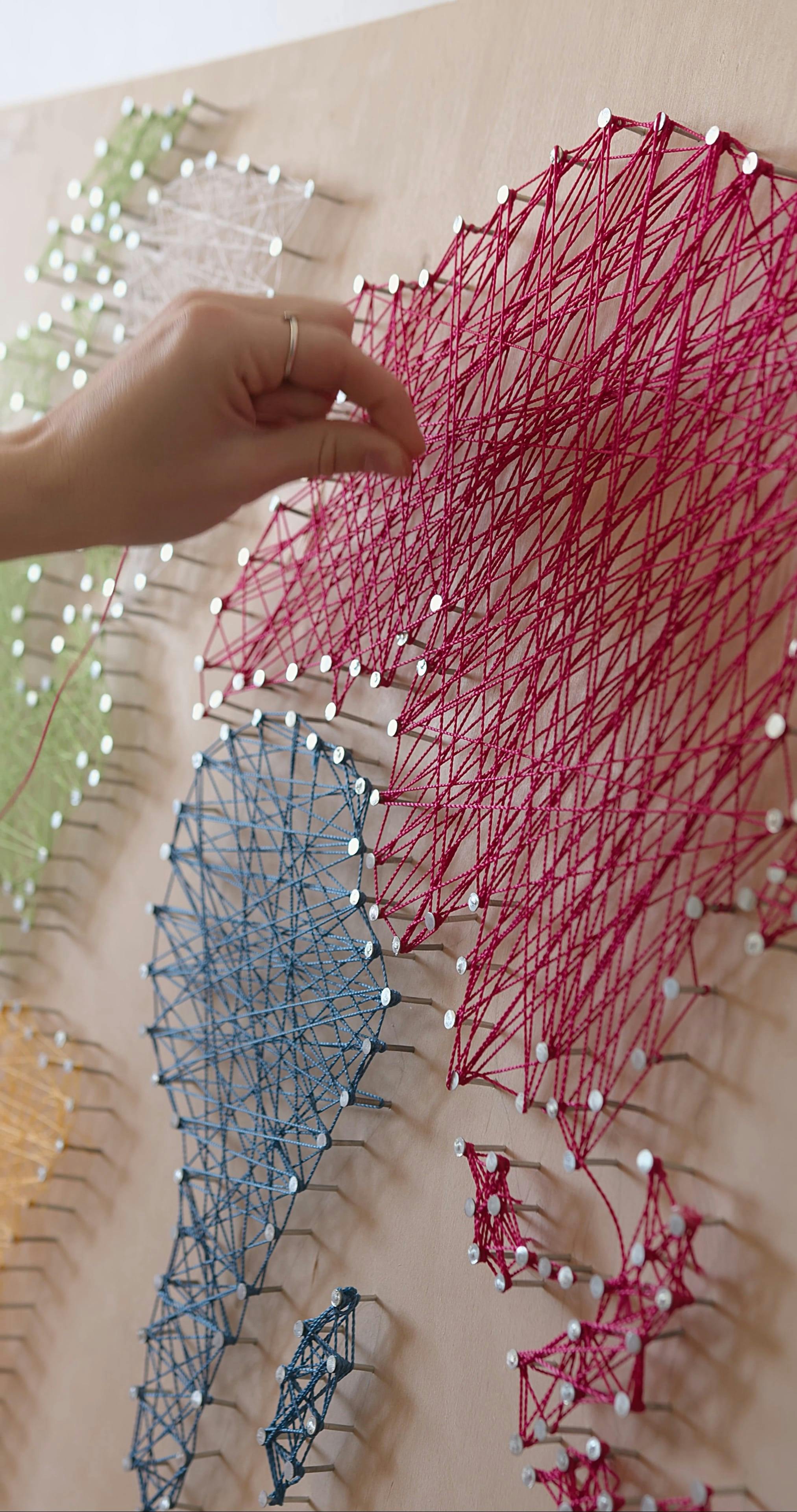 A Person Making an Art Using Colorful Threads Free Stock Video Footage ...