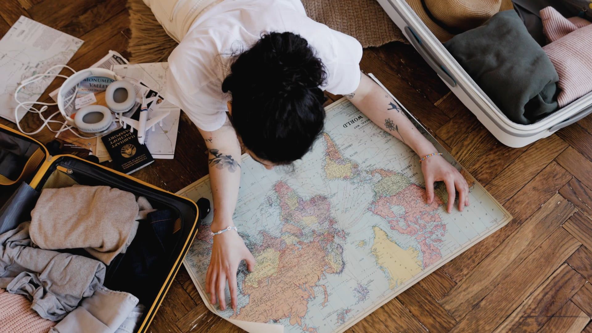 A Woman Looking at a World Map · Free Stock Video