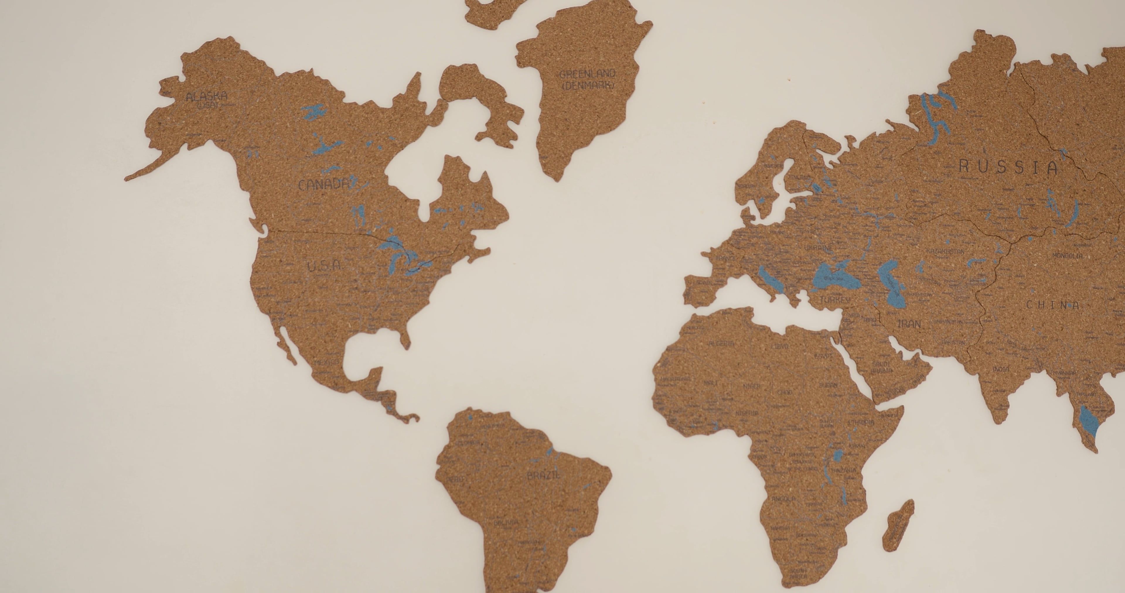 A Person Pointing Places in a World Map · Free Stock Video