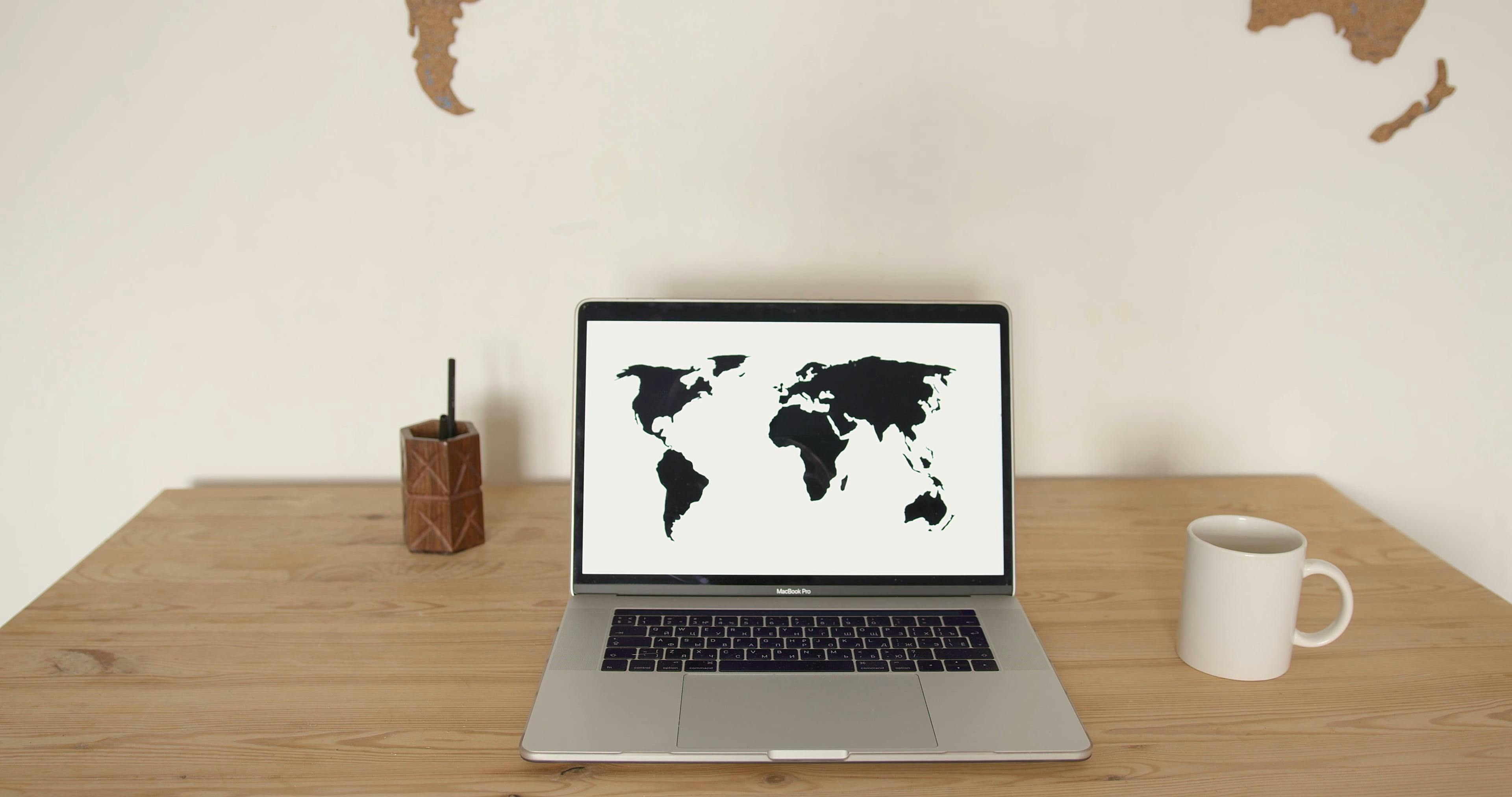 A Person Closing a Laptop on a Desk · Free Stock Video