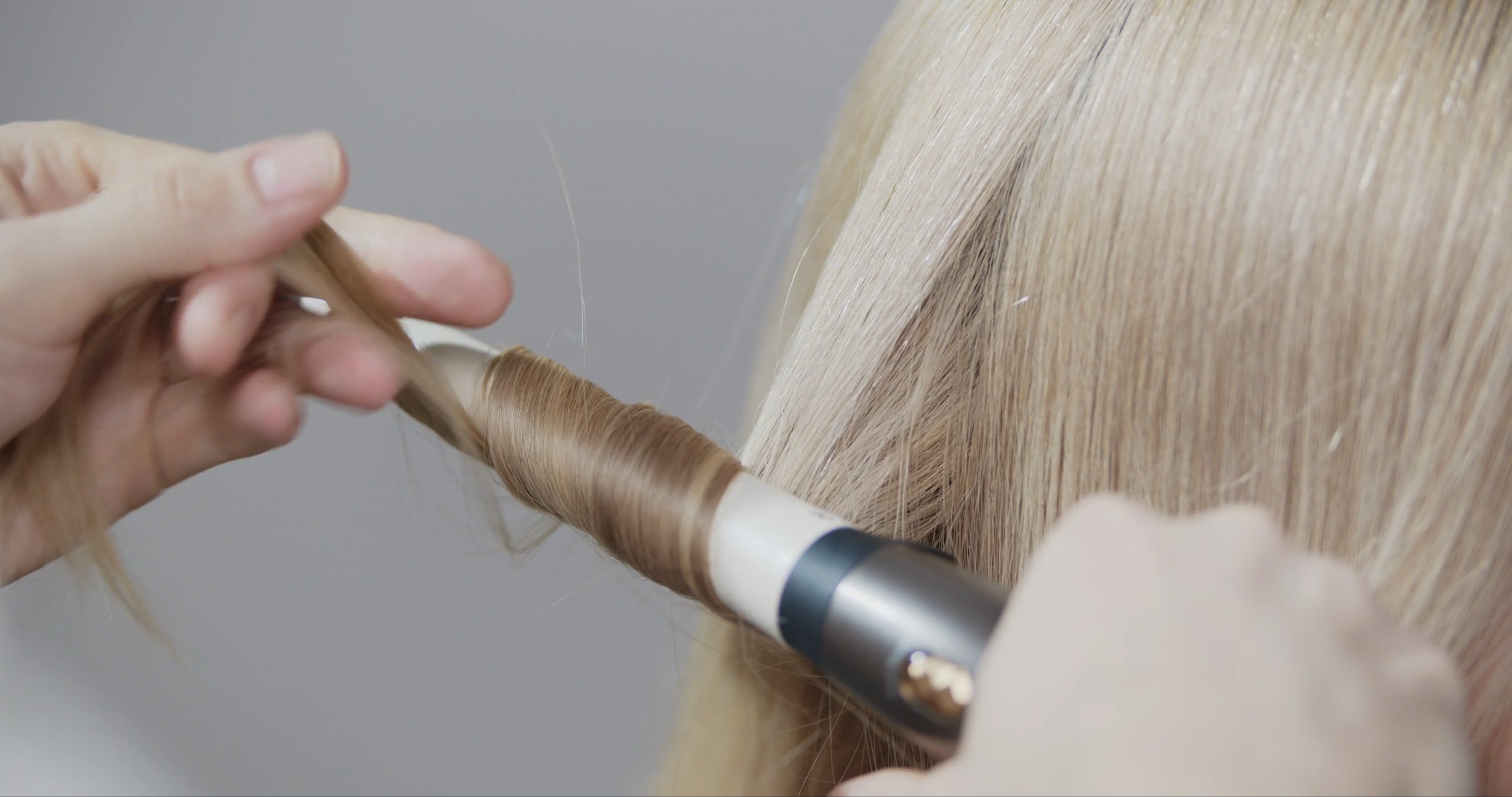 Close-Up View of Person Curling a Woman's Hair Free Stock Video Footage ...