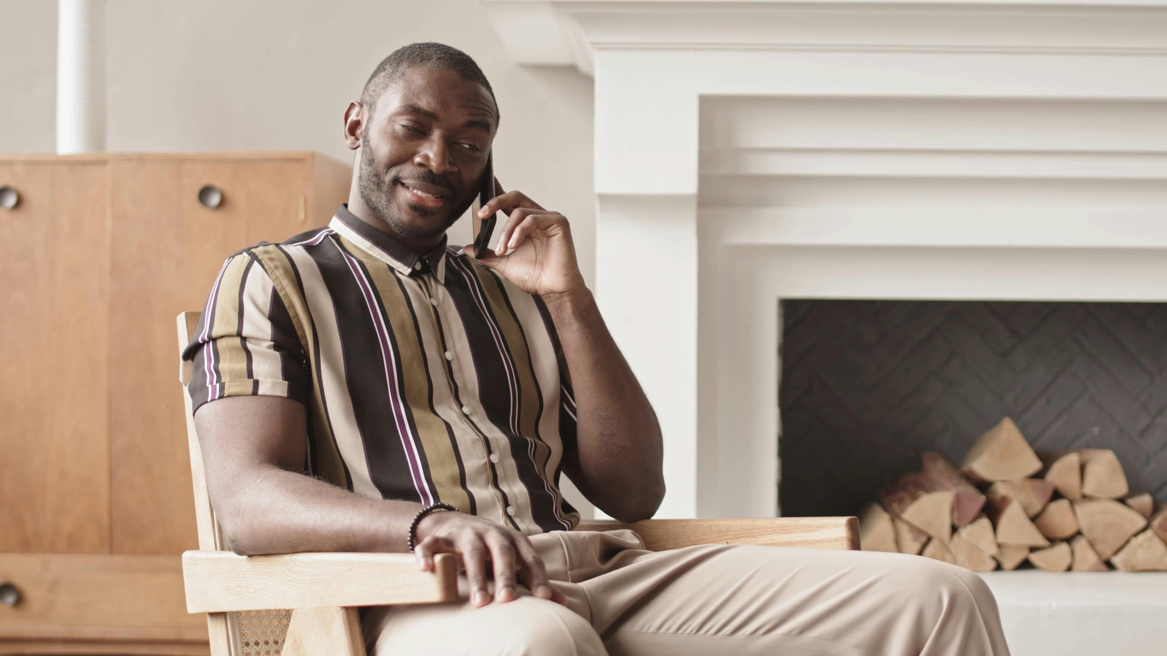 Man Using Cellphone at Home · Free Stock Video