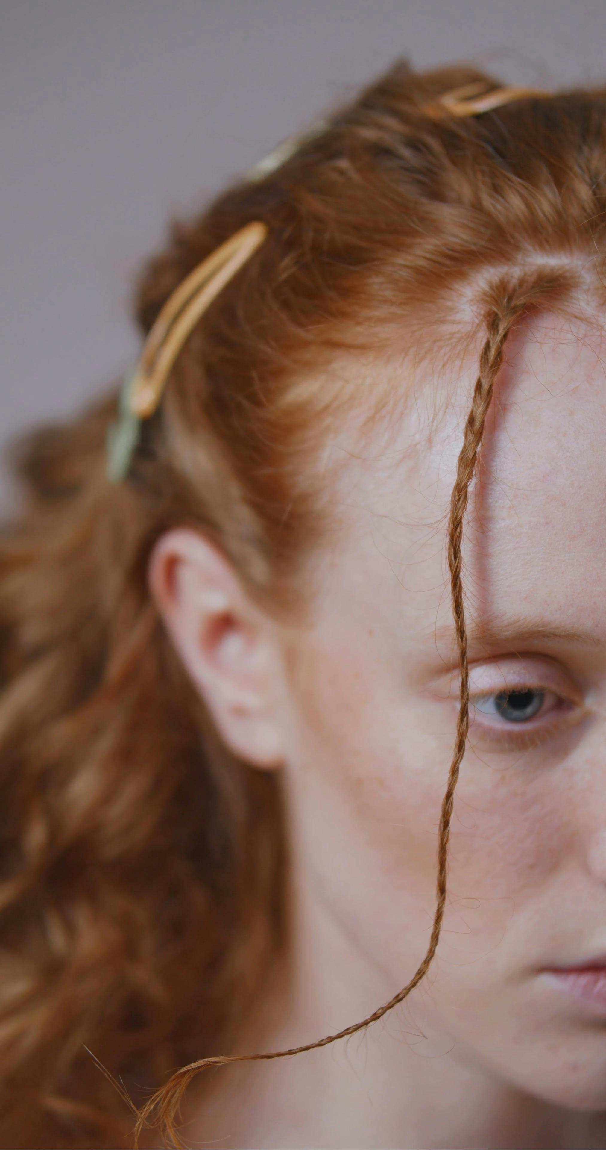 Woman Styling her Hair · Free Stock Video