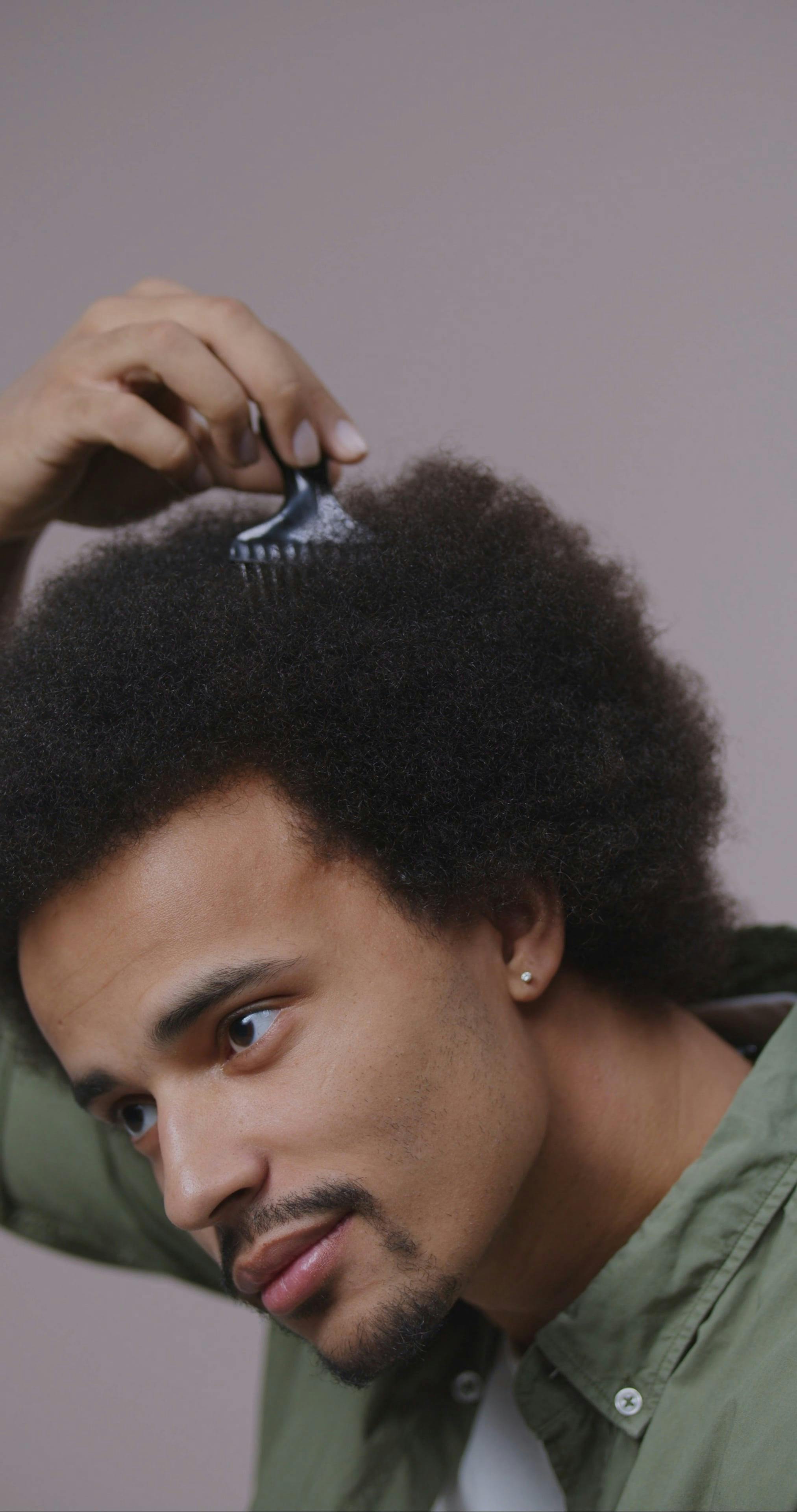 Man Combing His Afro Hair Free Stock Video Footage, Royalty-Free 4K ...