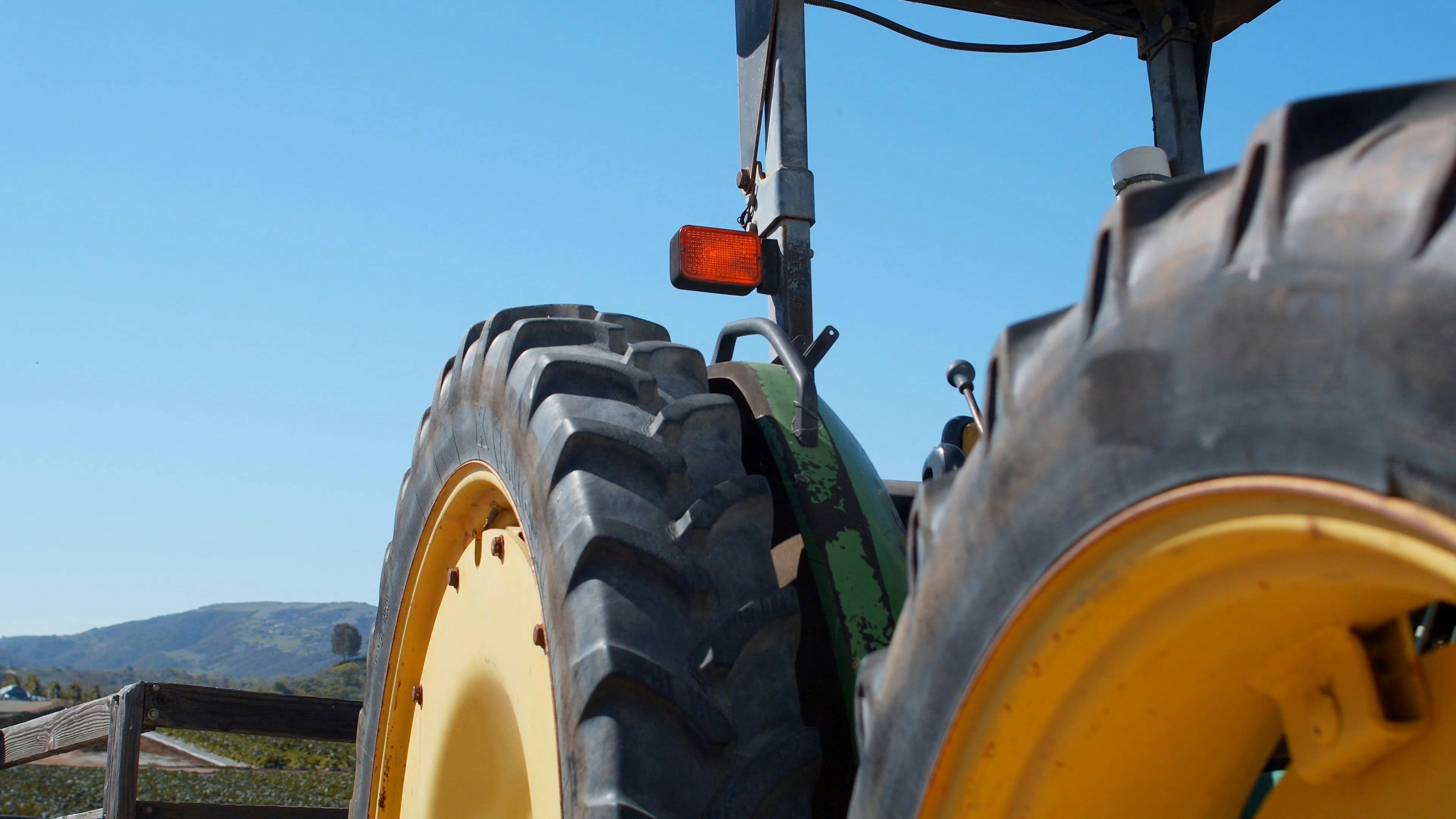 A Man Riding a Tractor · Free Stock Video