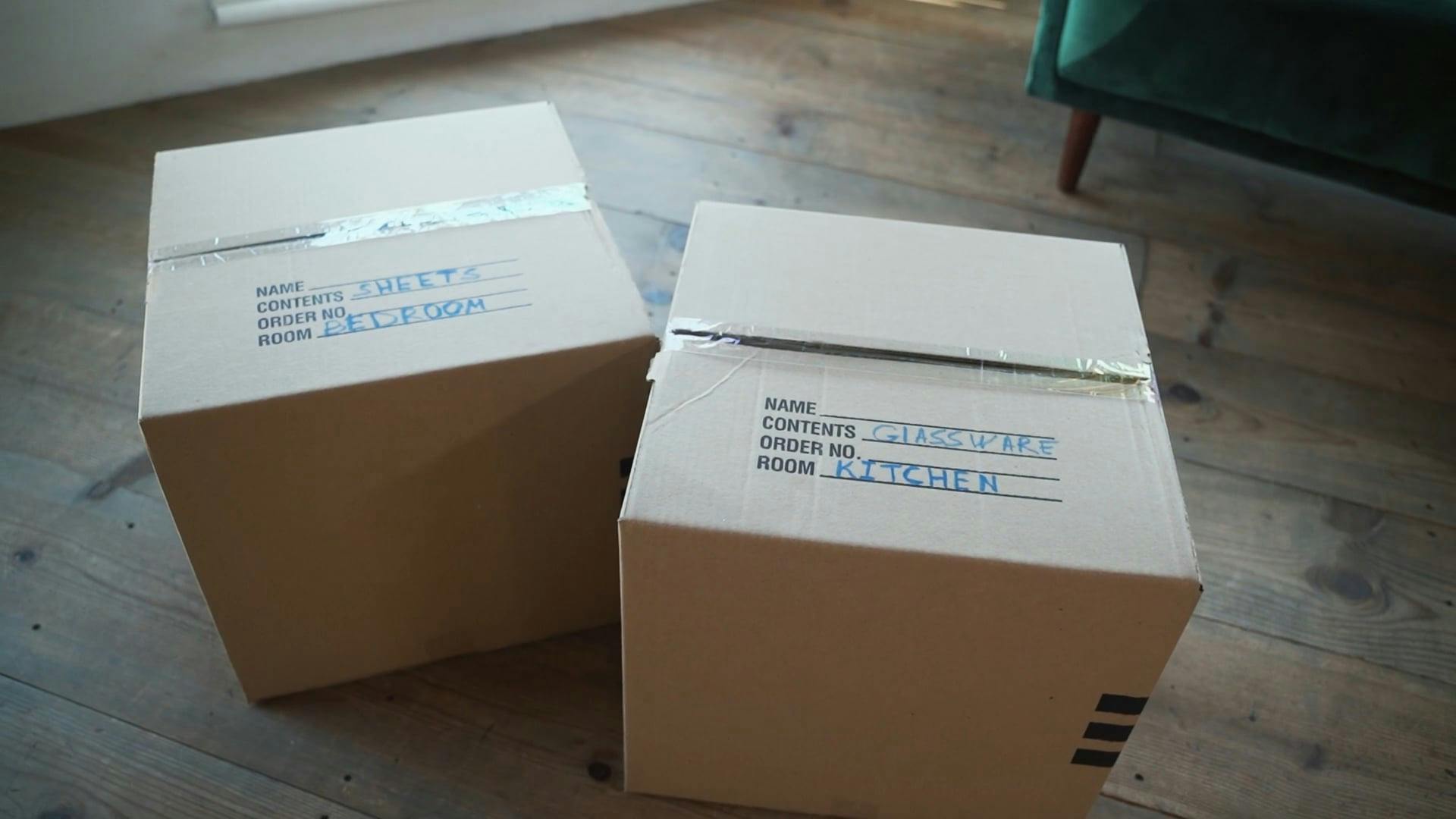 Labeled Boxes of Belongings · Free Stock Video