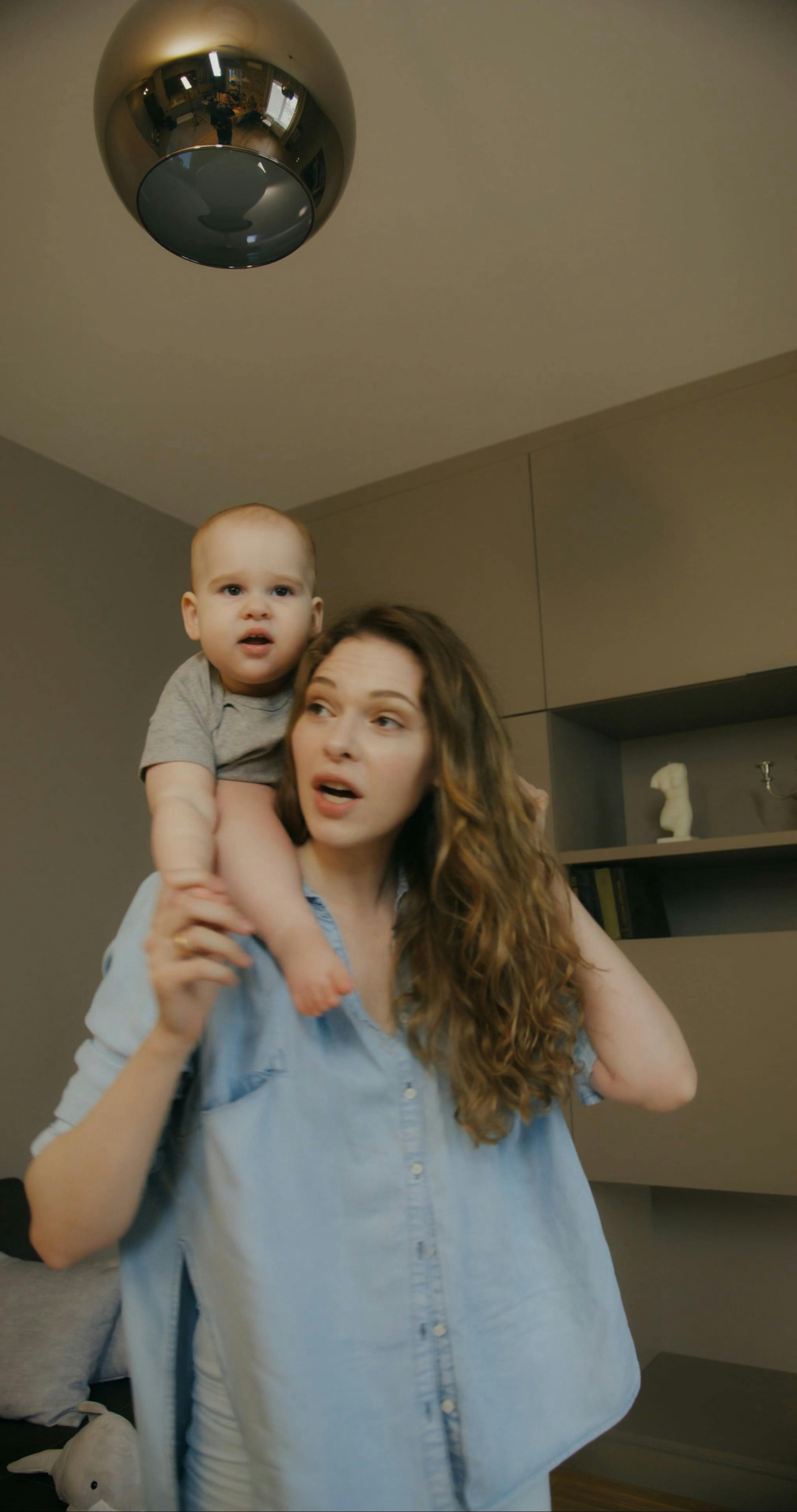 Mother Carrying Baby on the Back · Free Stock Video