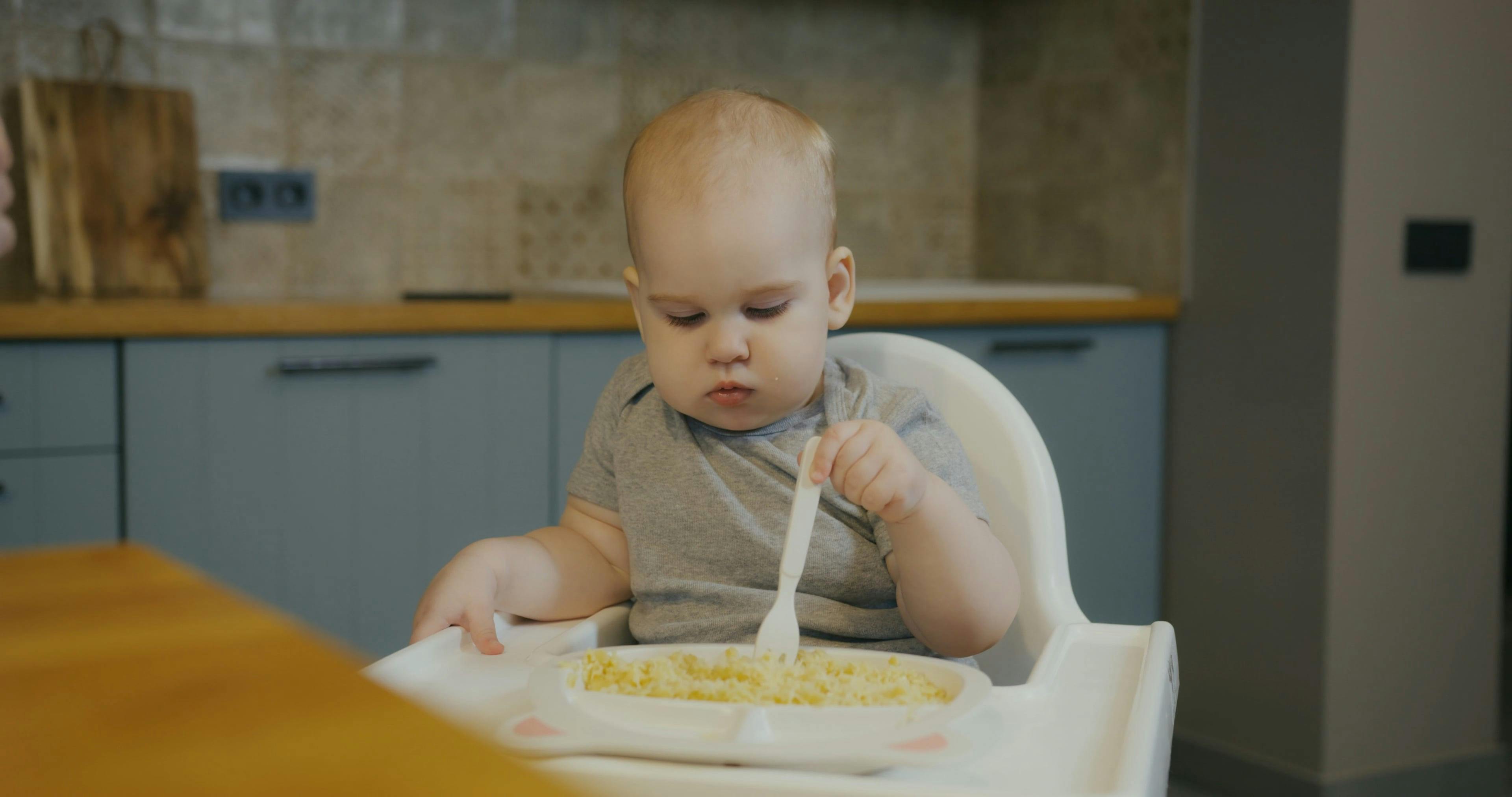 A Toddler Eating His Food Free Stock Video Footage, Royalty-Free 4K ...