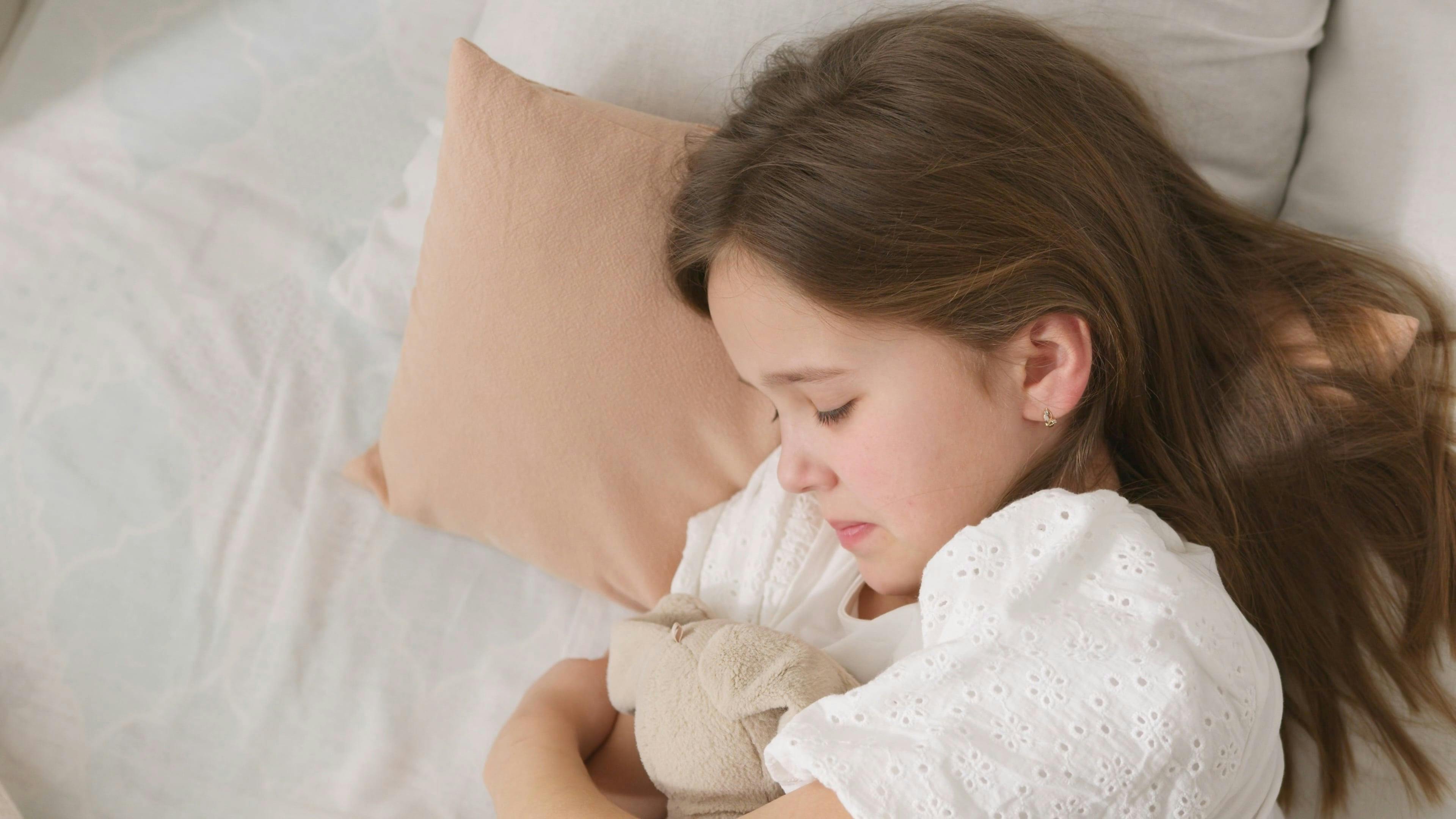 Girl in Bed Crying Hugging Teddy Bear · Free Stock Video