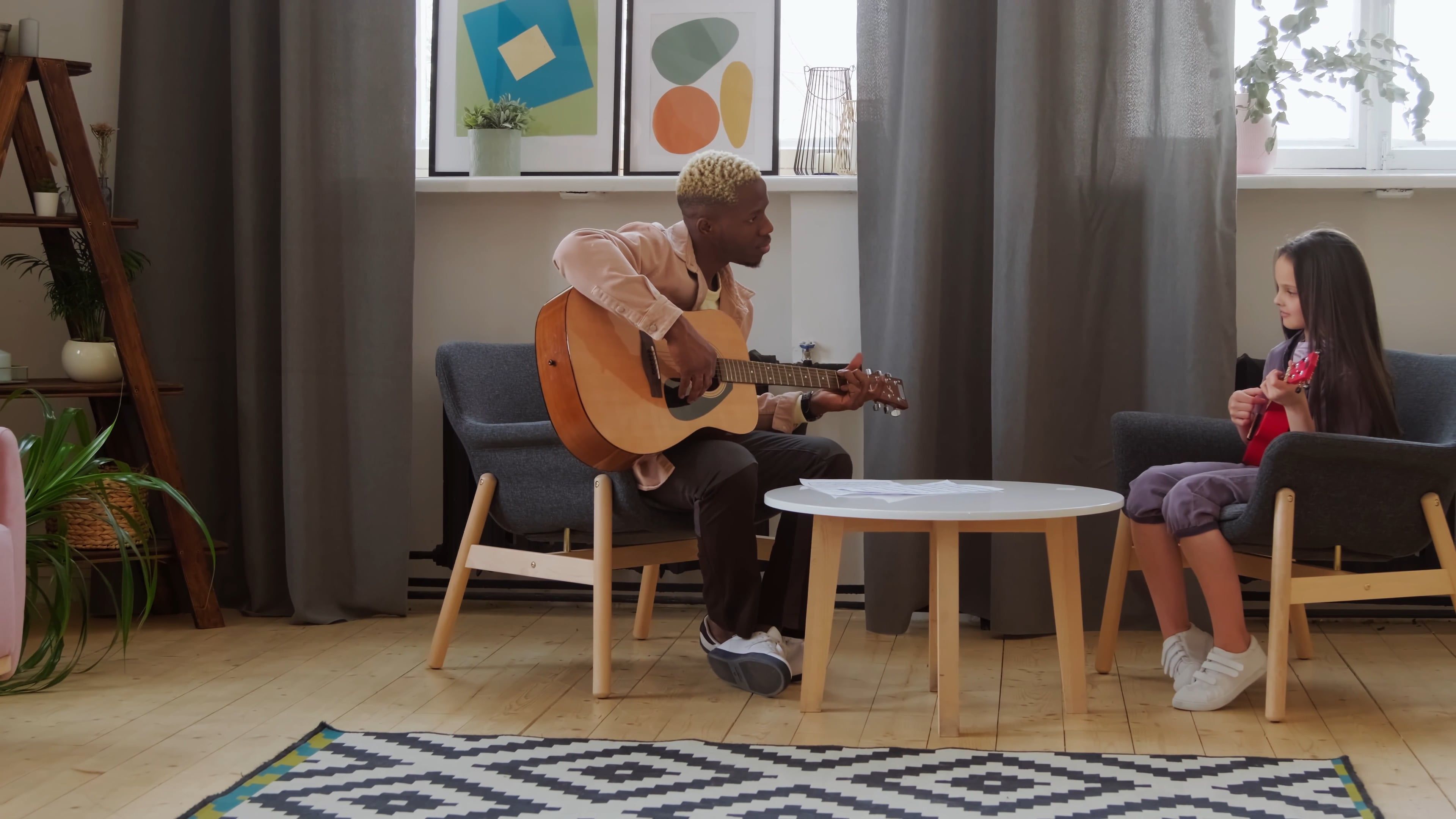 Man Giving Guitar Lessons Free Stock Video Footage, Royalty-Free 4K ...