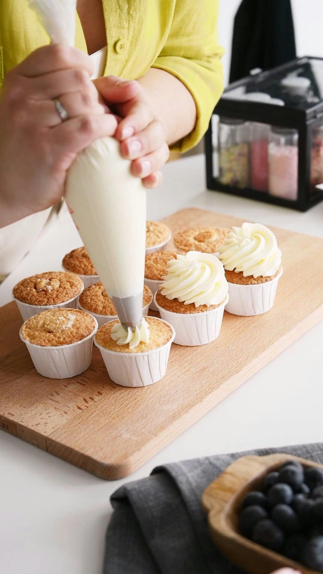 A Woman Putting Icing on the Cupcakes Free Stock Video Footage, Royalty ...