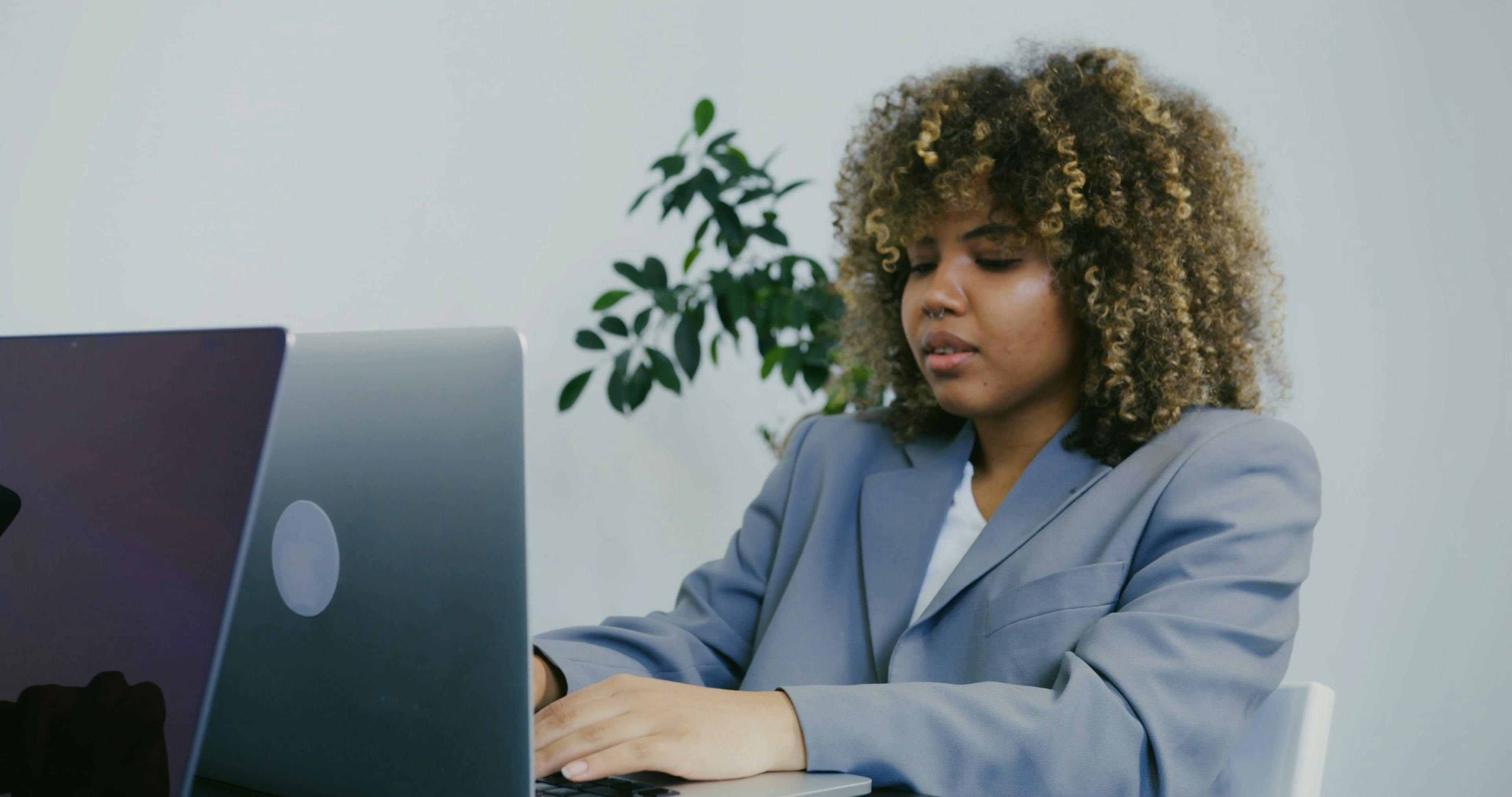 Woman Working on a Lapptop Free Stock Video Footage, Royalty-Free 4K ...
