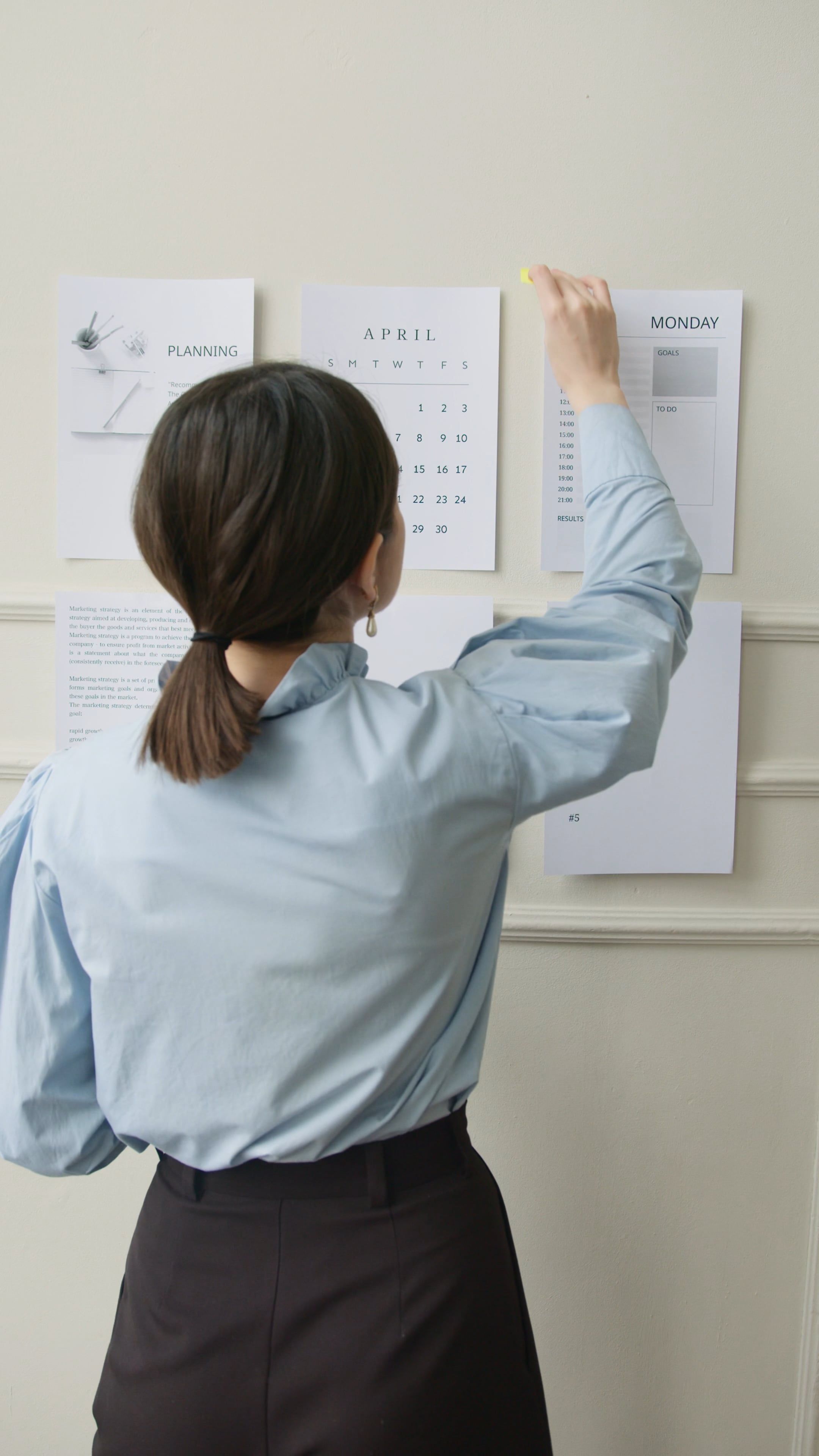 Back View of a Woman Pasting Sticky Notes to a Document Free Stock ...