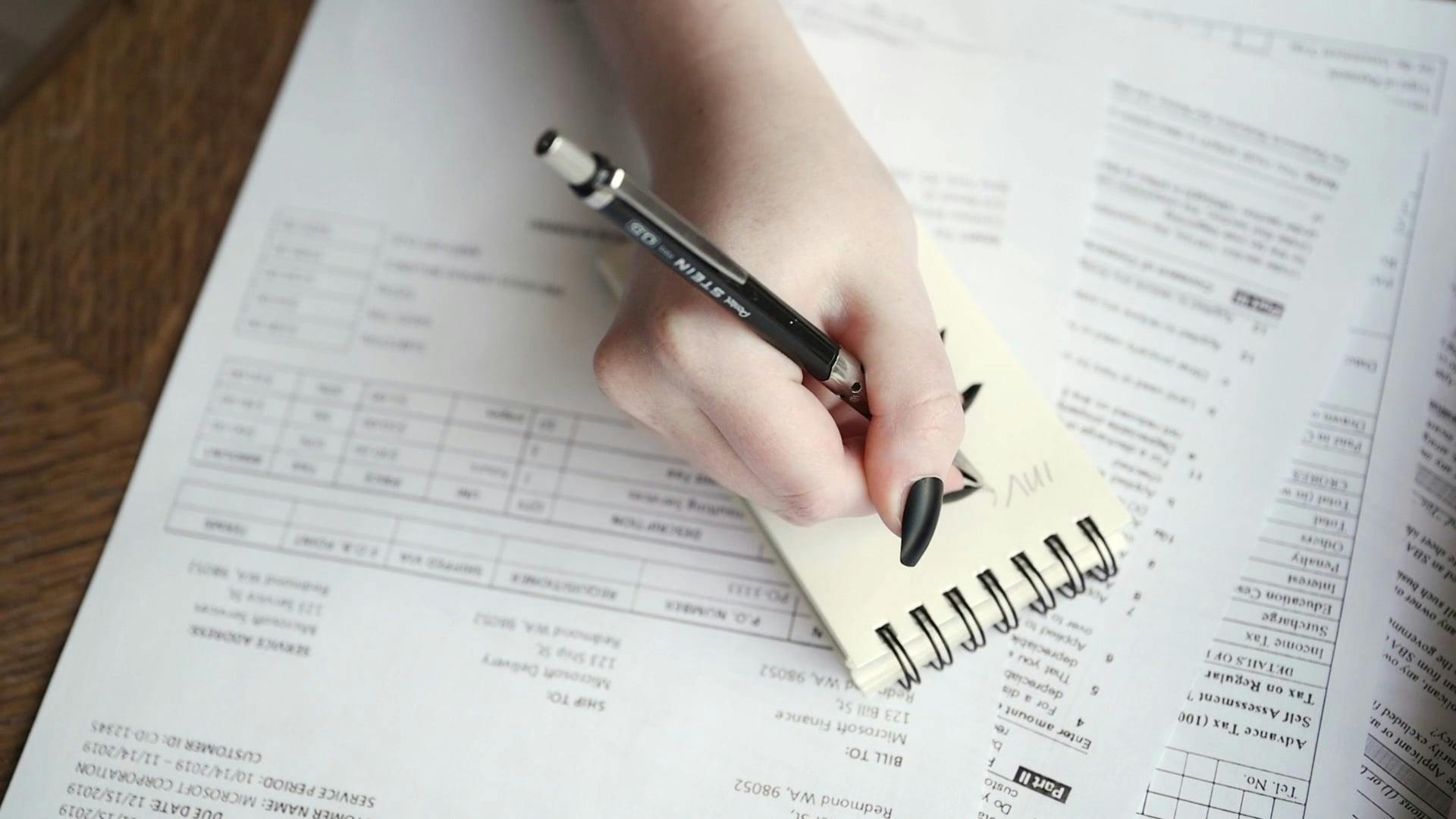 Hand Writing Notes in Paper · Free Stock Video