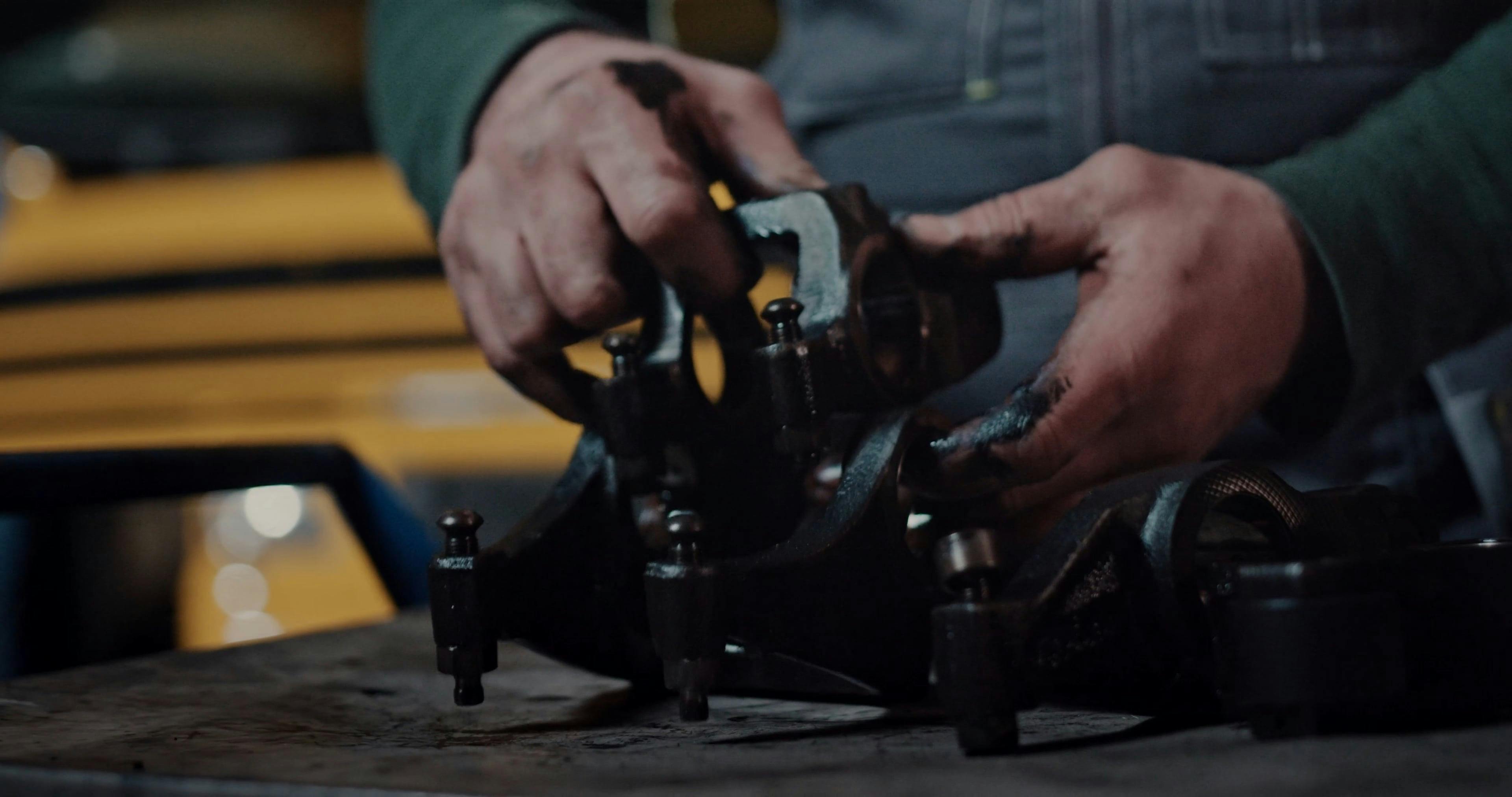 Close up of a Mechanic Disassembling a Greasy Car Part Free Stock Video ...