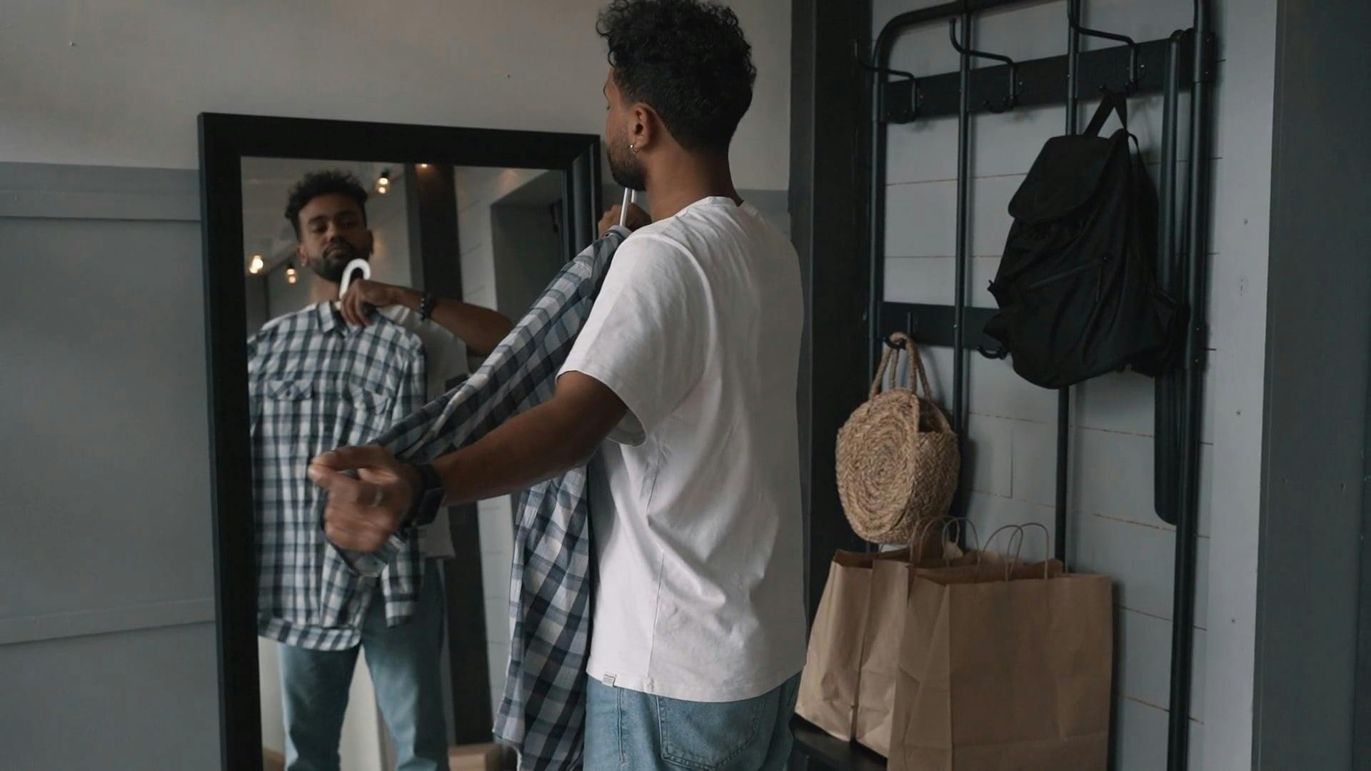 A Man Fitting Clothes at the Fitting Room Free Stock Video Footage ...