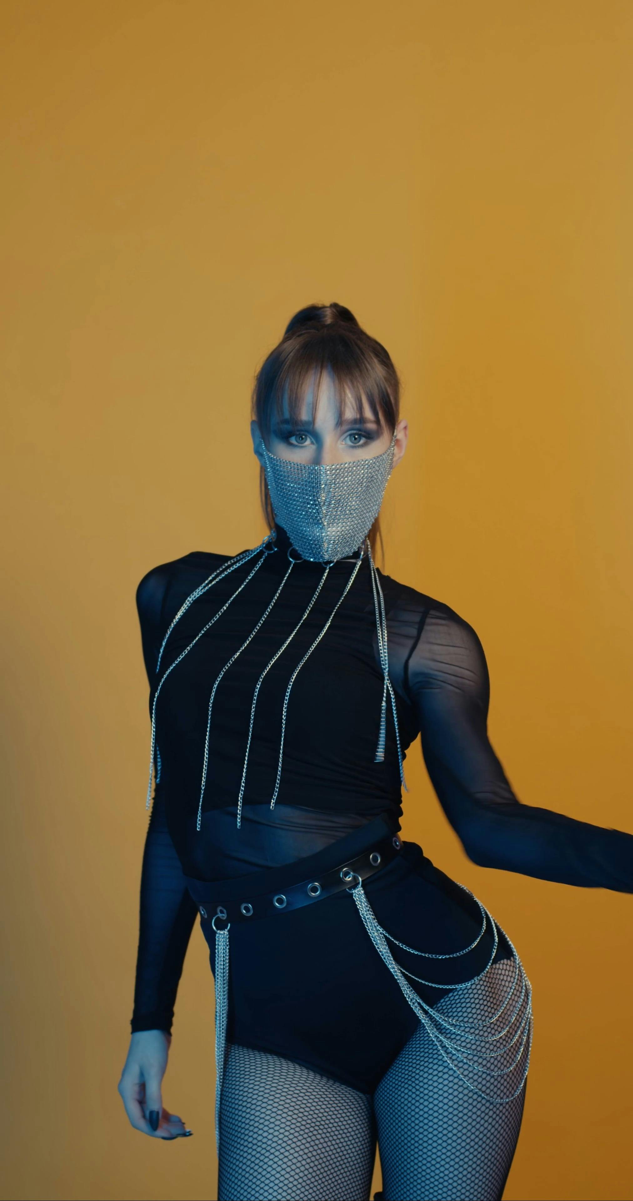 Woman Posing With Face Mask · Free Stock Video