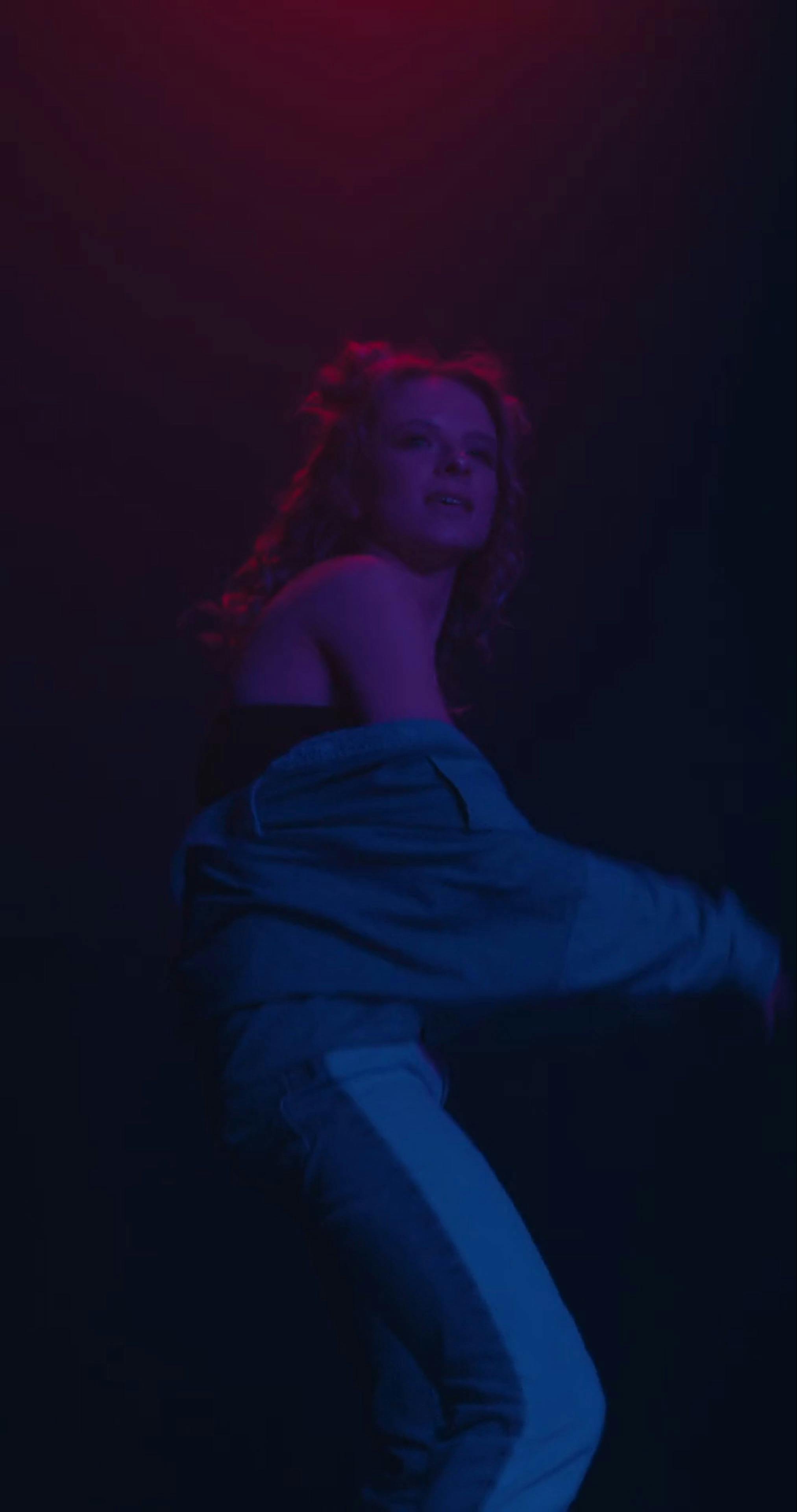 Woman Dancing in a Dark Room · Free Stock Video