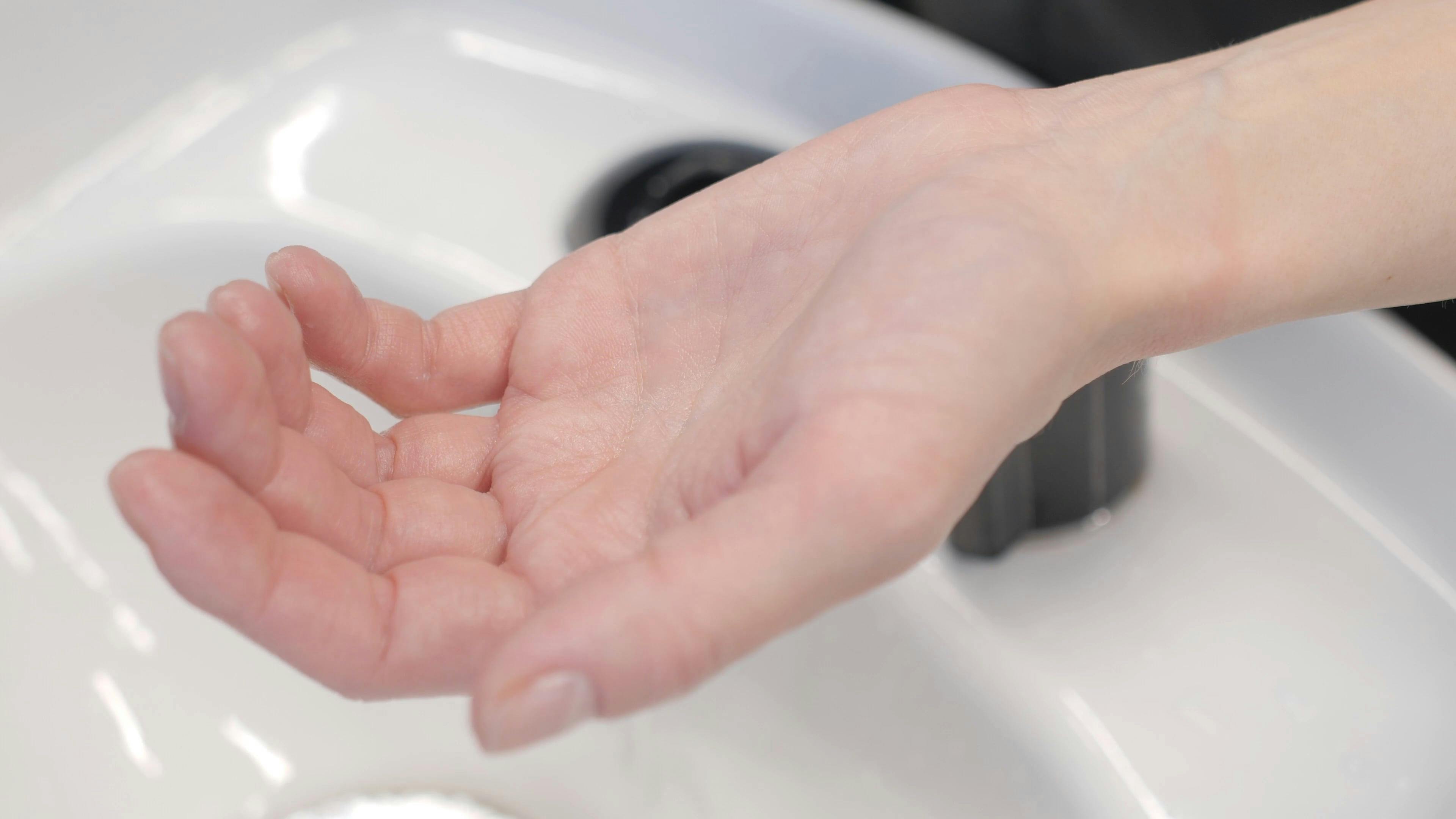 A Person Pouring Conditioner on Her Palm Free Stock Video Footage ...