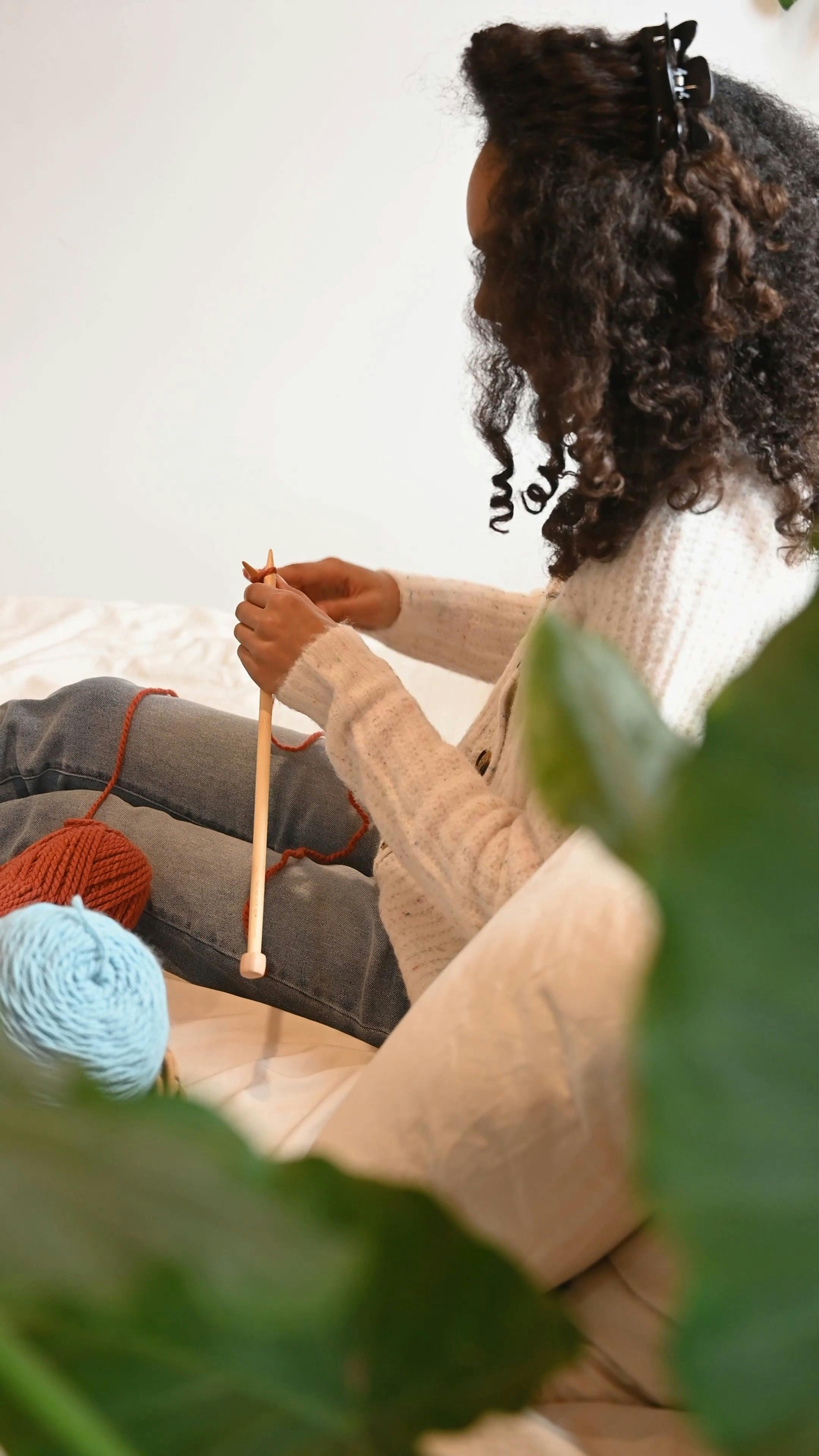 Woman Knitting while Sitting · Free Stock Video