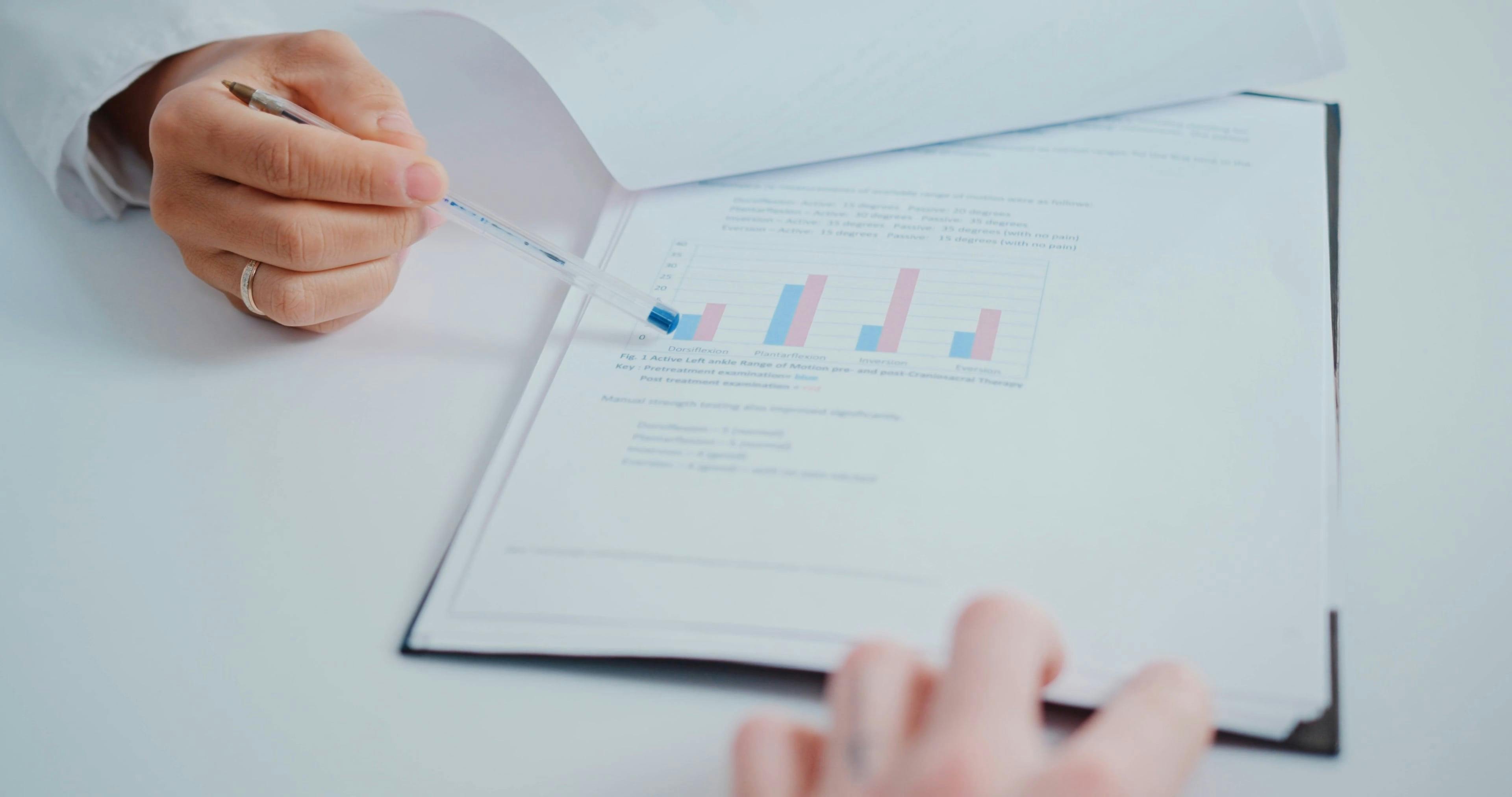 Person Showing a Medical Chart · Free Stock Video