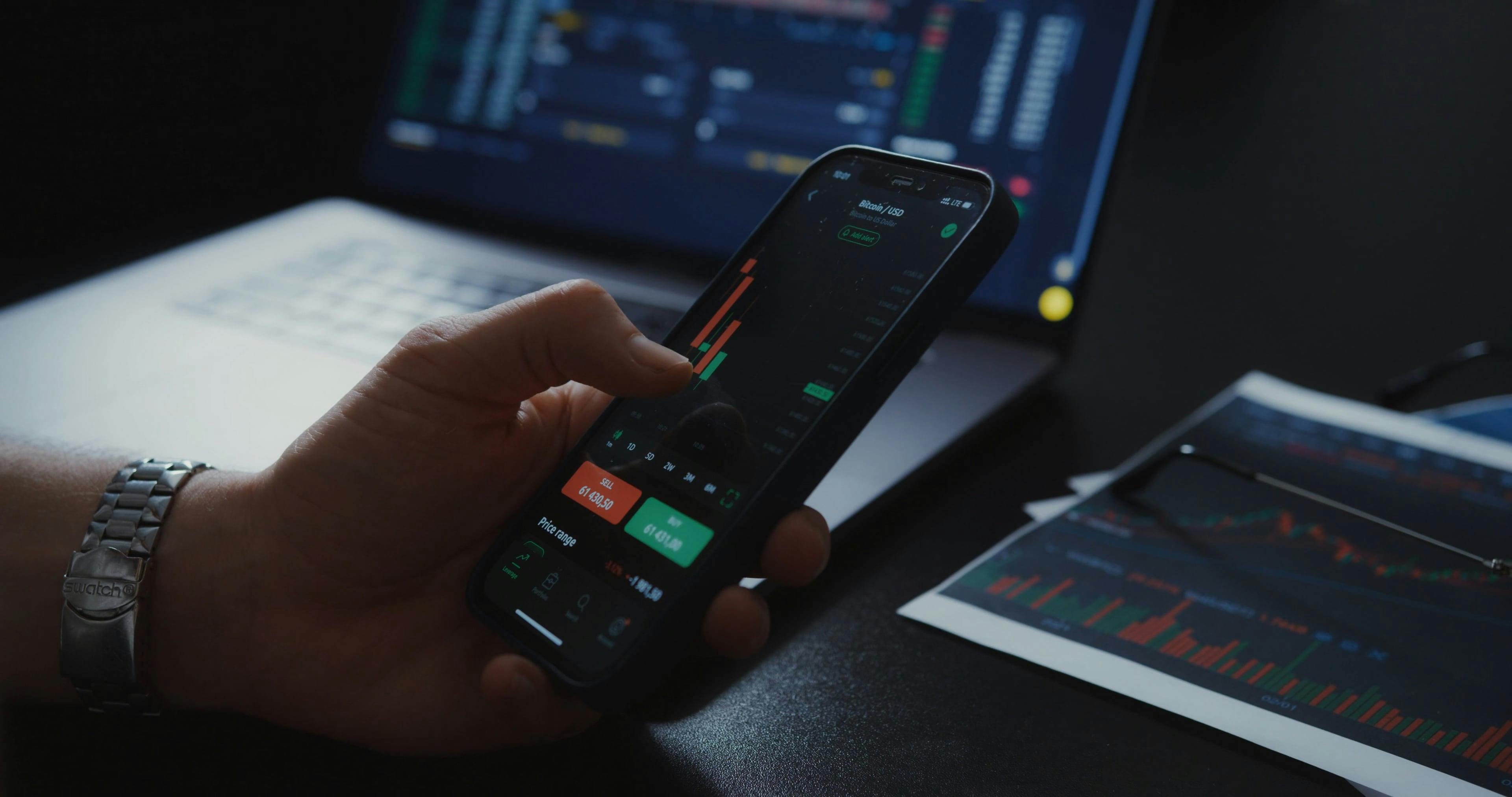 A Man Reading a Graph on His Cellphone · Free Stock Video