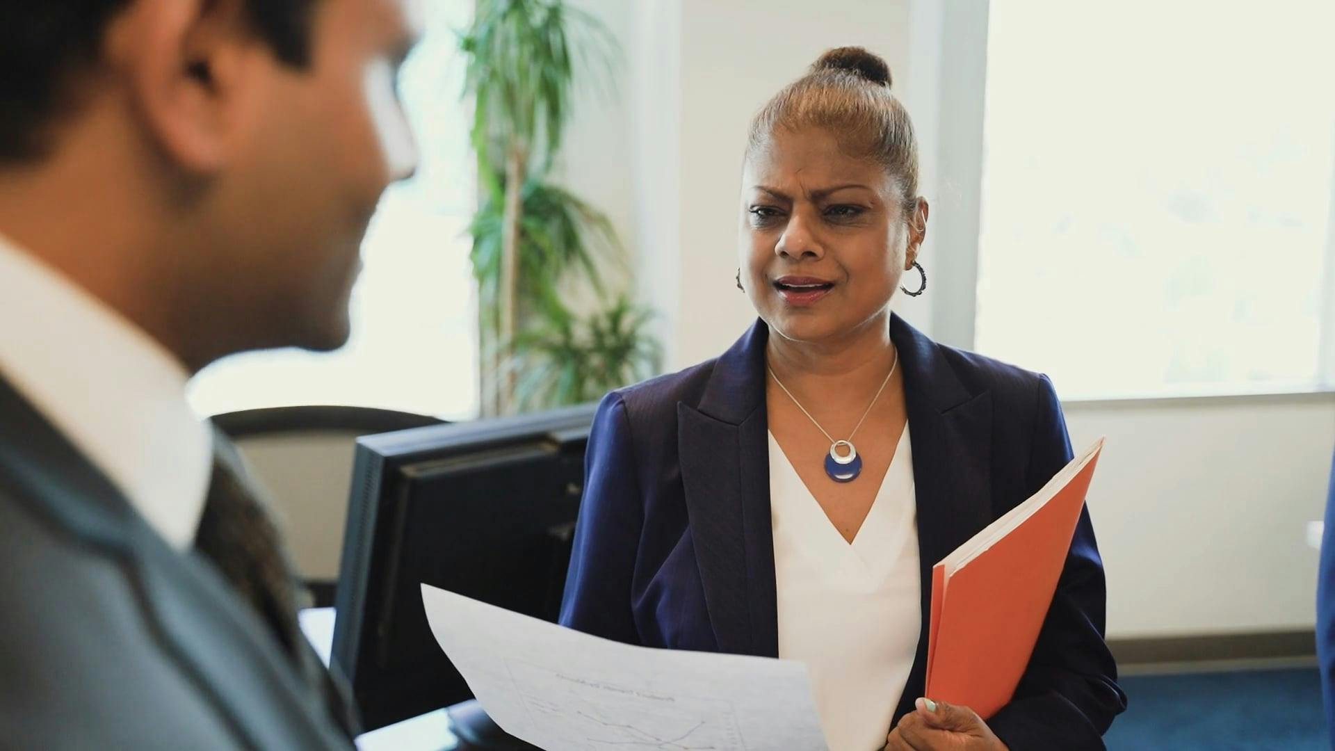 Man Talking while Holding paper · Free Stock Video
