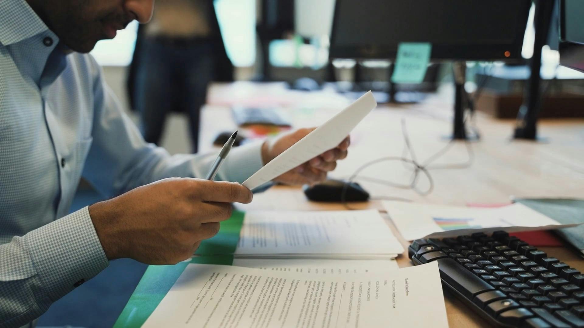 Man Working on Office Fixing Paper Works Free Stock Video Footage ...