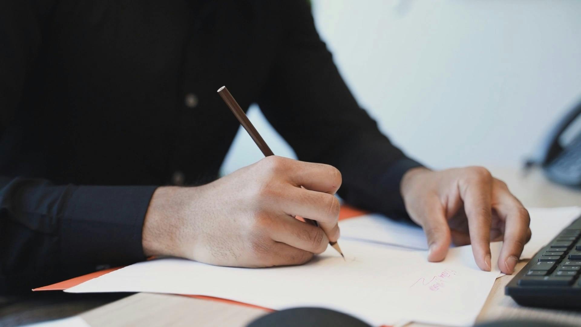 Person Signing the Documents · Free Stock Video