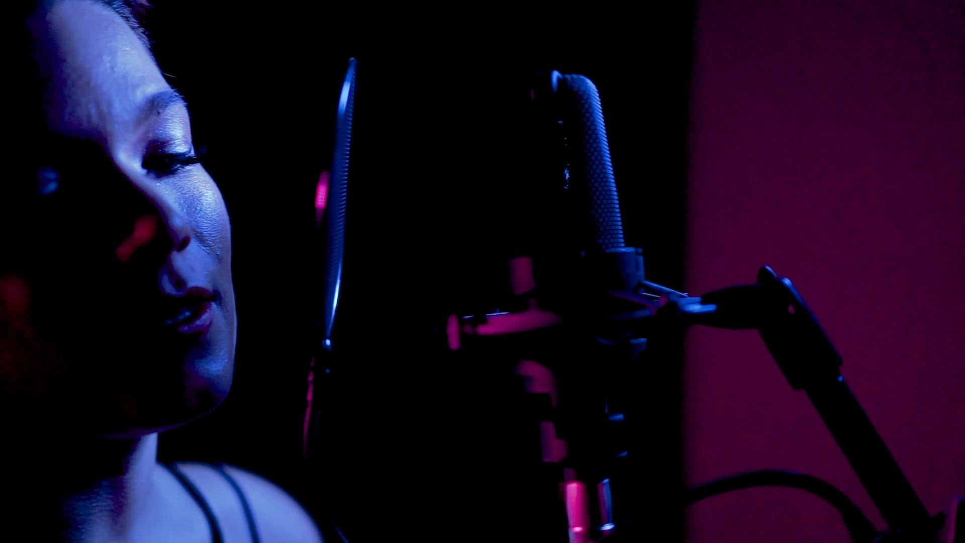 A Woman Singing while Using Condenser Microphone Free Stock Video ...