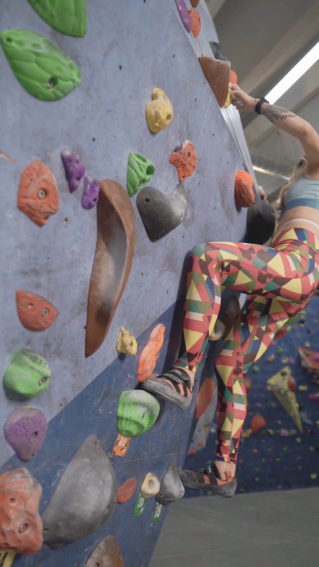 Female Climber Reaching the Top of a Climbing Wall · Free Stock Video