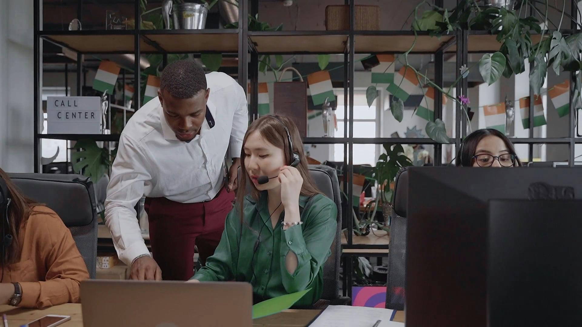 Male Boss Showing a Thumbs Up Sign to a Female Employee · Free Stock Video