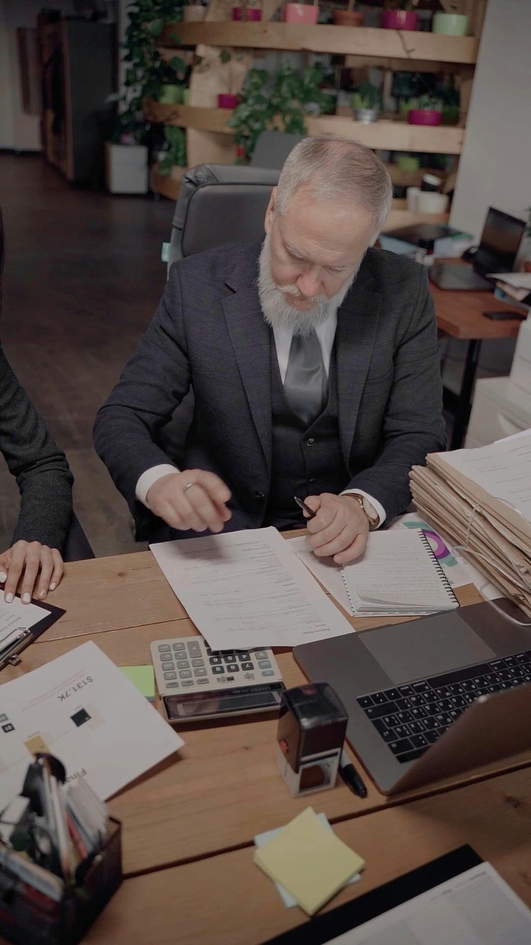 Elderly Man Signing Documents · Free Stock Video