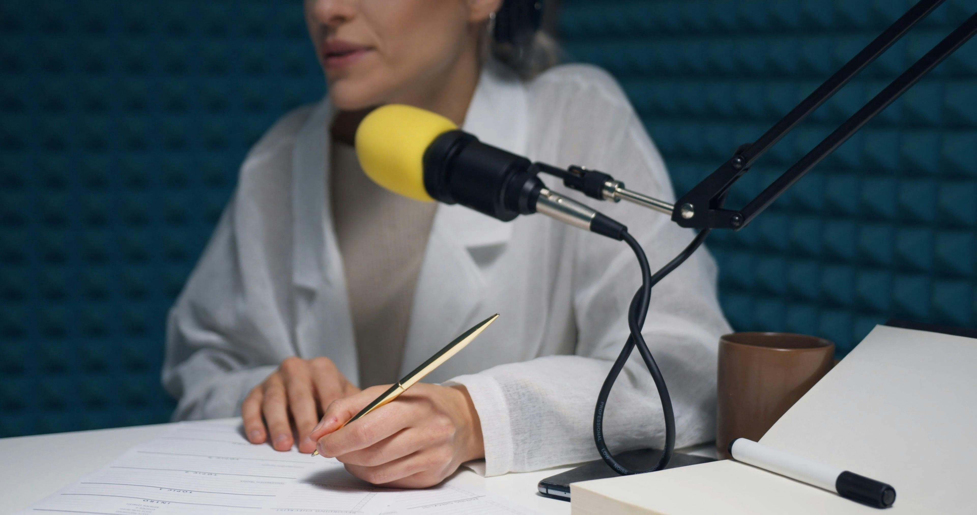 A Woman Talking on a Microphone · Free Stock Video