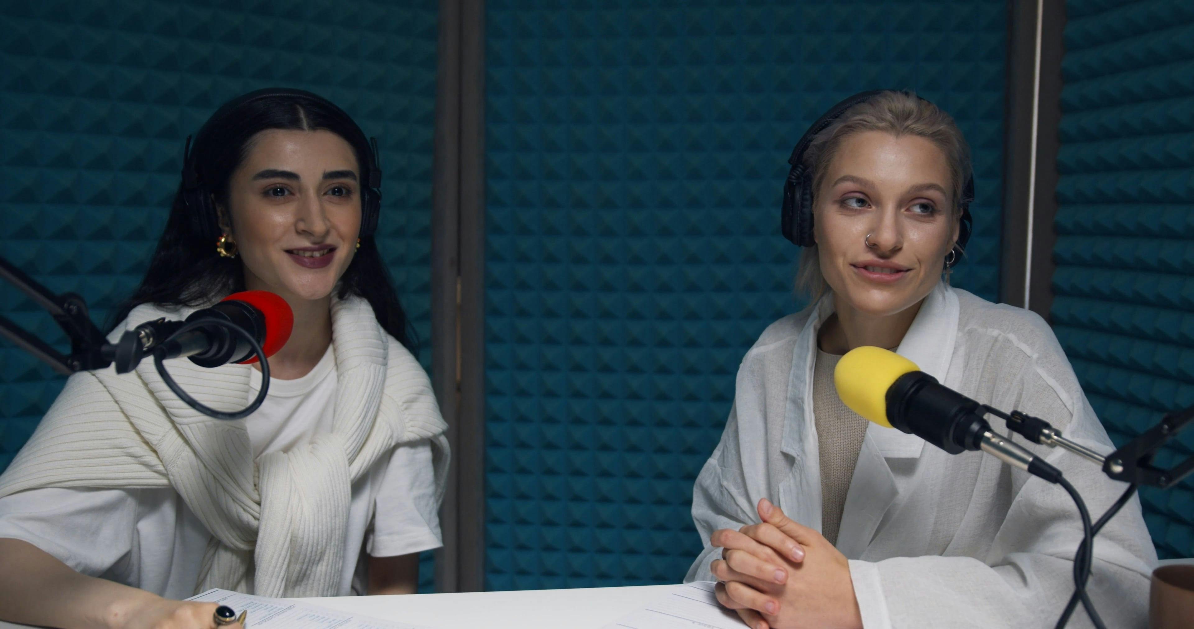 Women Talking with Microphones · Free Stock Video