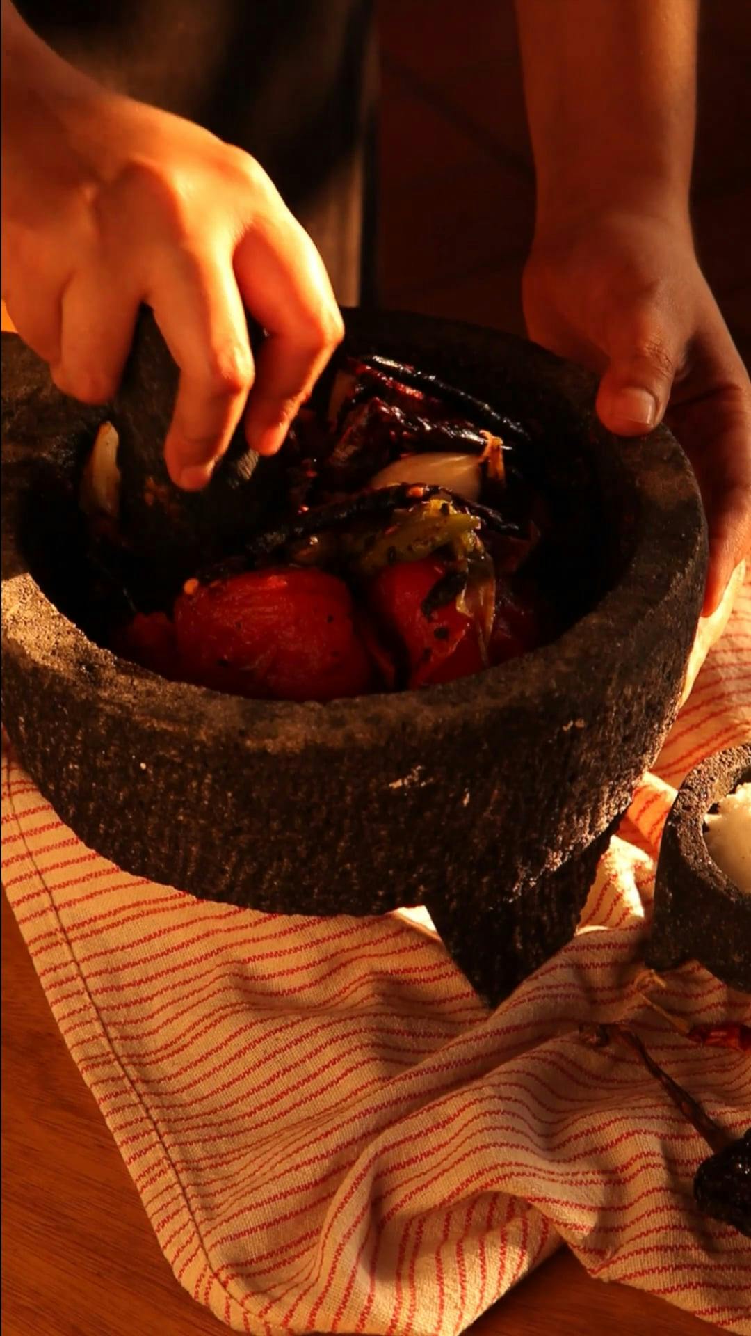 Person Mashing Roasted Ingredients on Mortar and Pestle · Free Stock Video