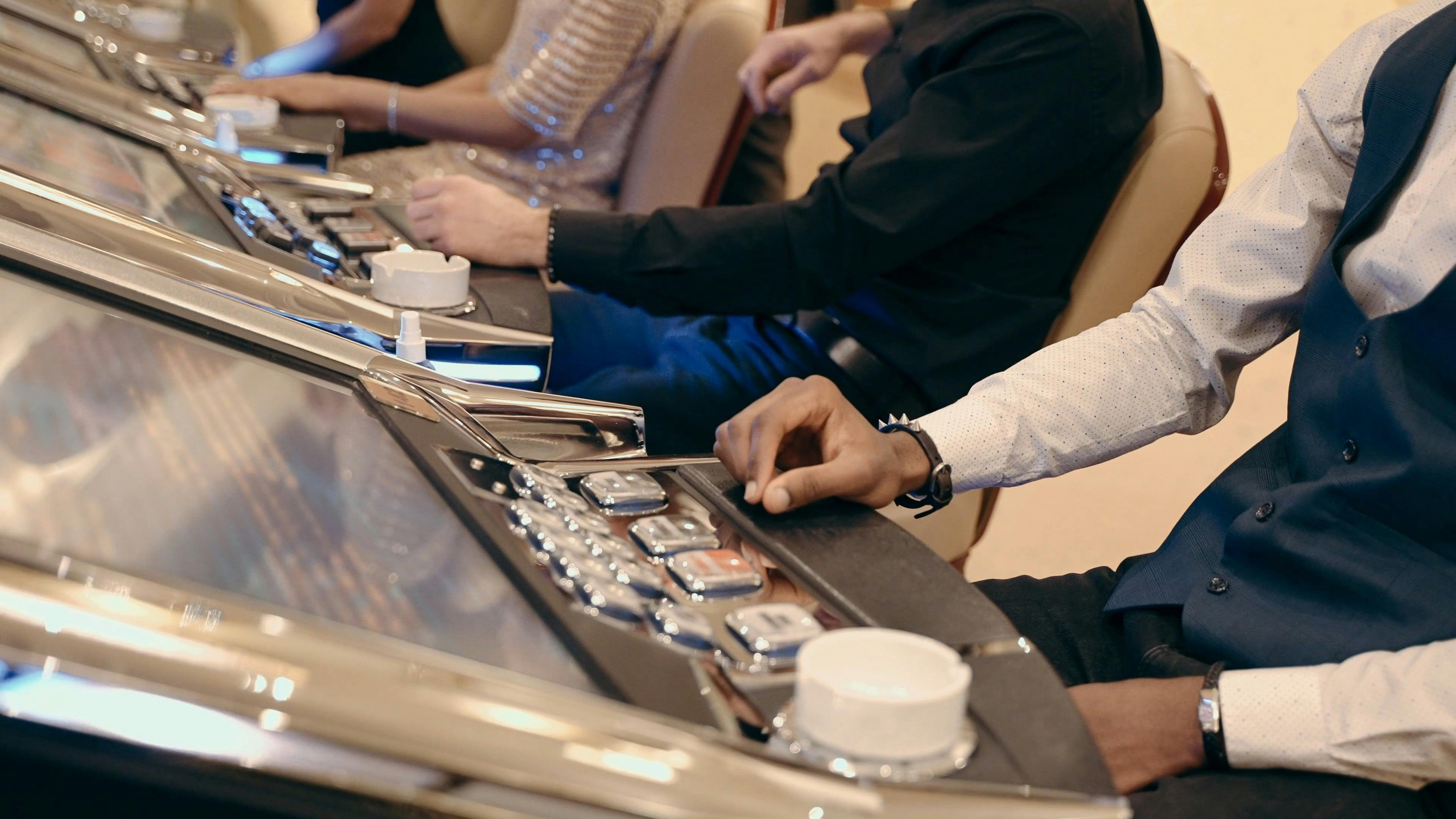 People Playing the Slot Machine · Free Stock Video