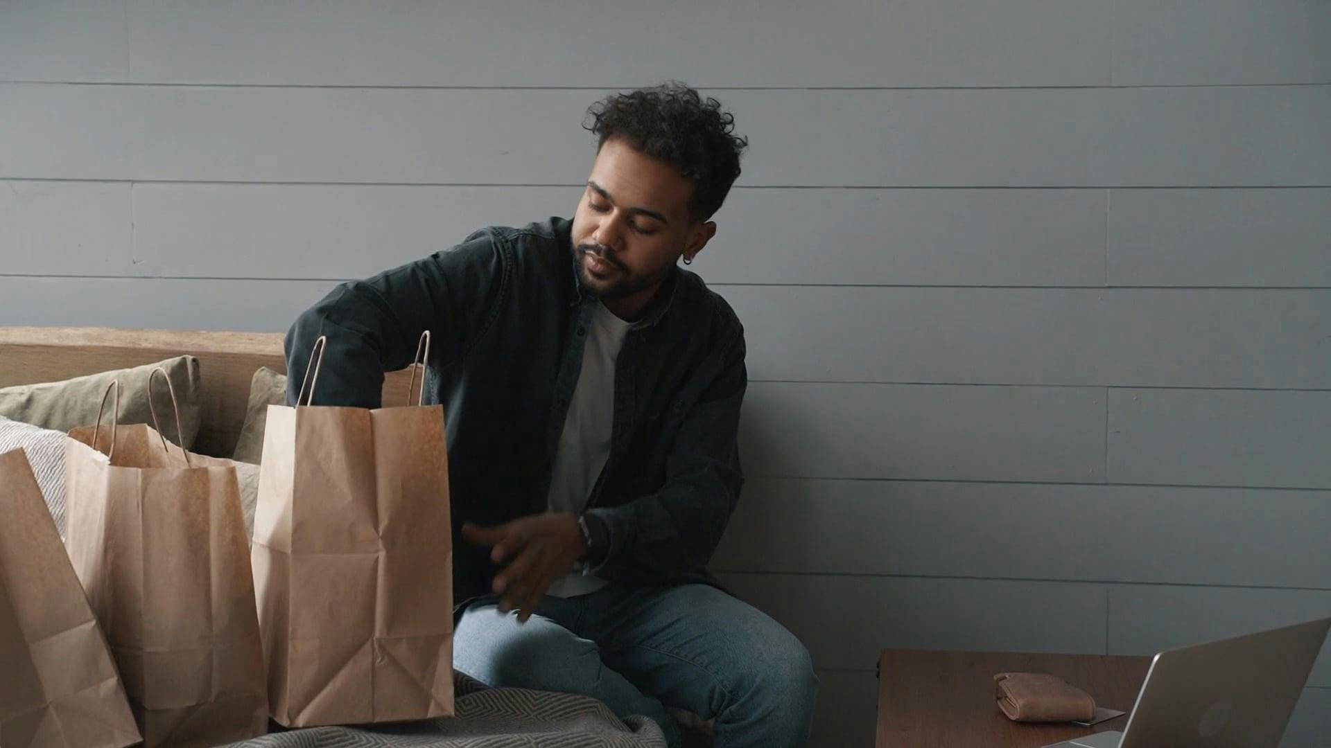 A Man Happy with His Purchase · Free Stock Video