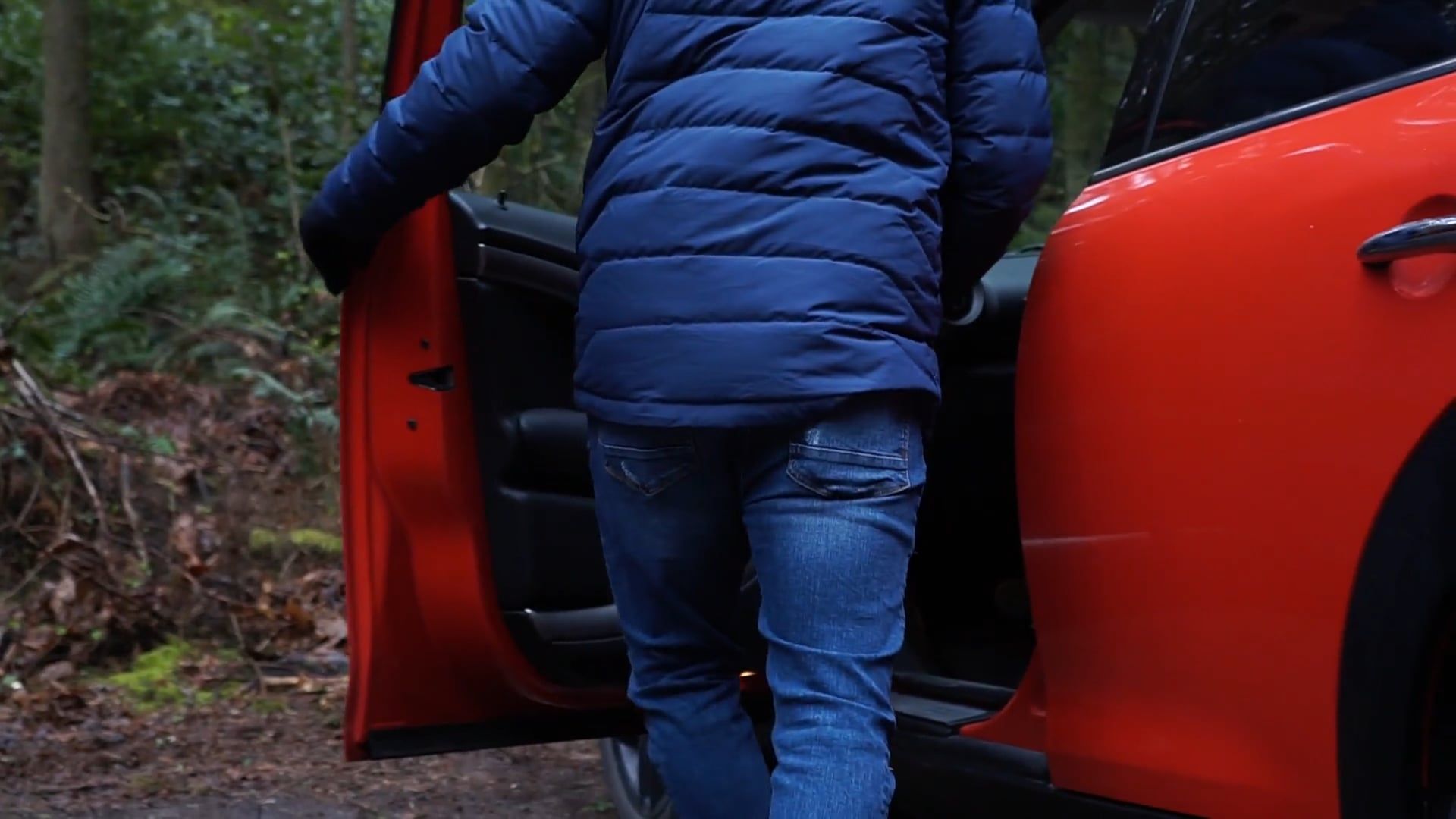 A Man Going Inside His Red Car · Free Stock Video