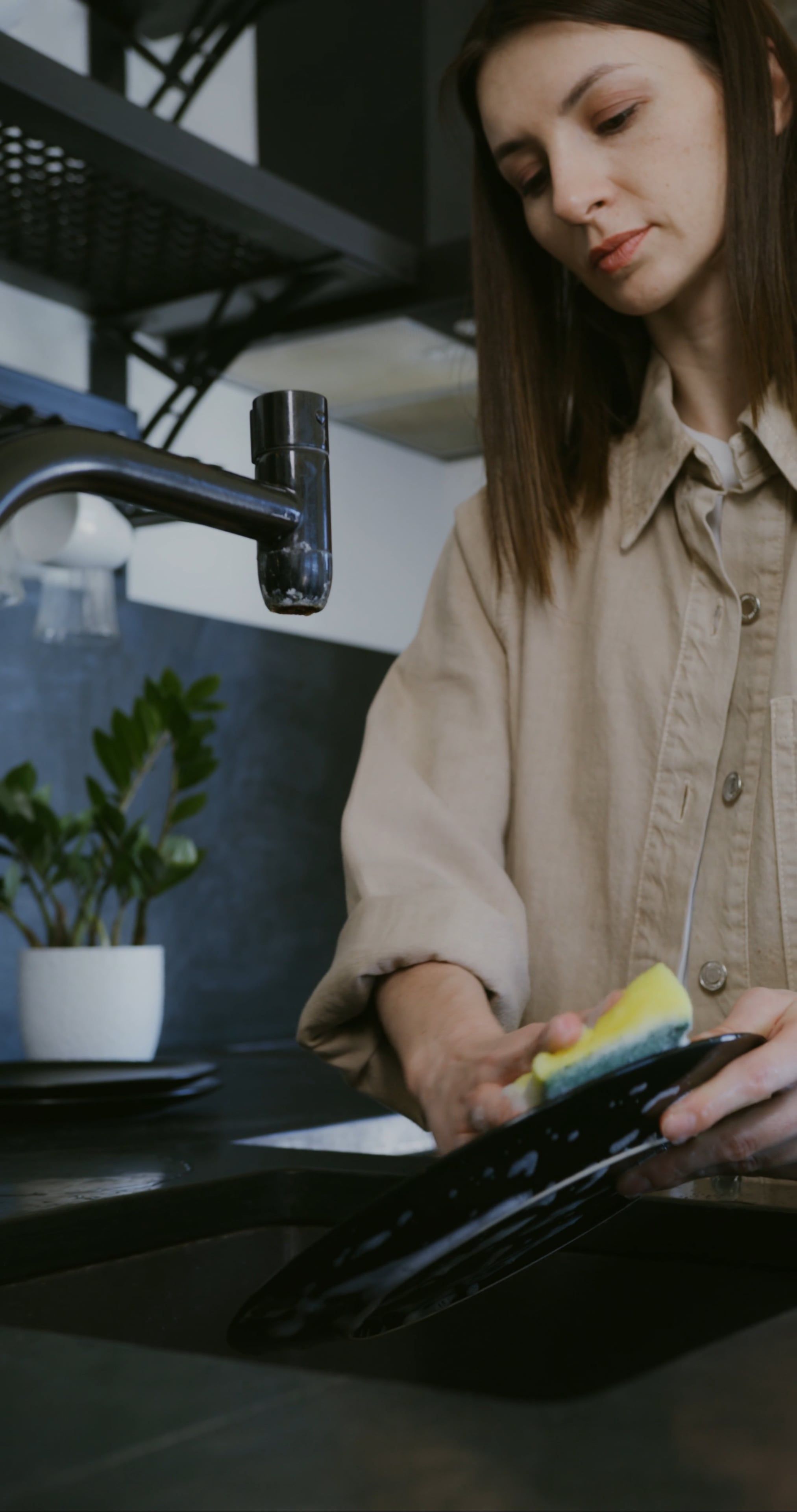 Girl Putting Soap on a Sponge · Free Stock Video