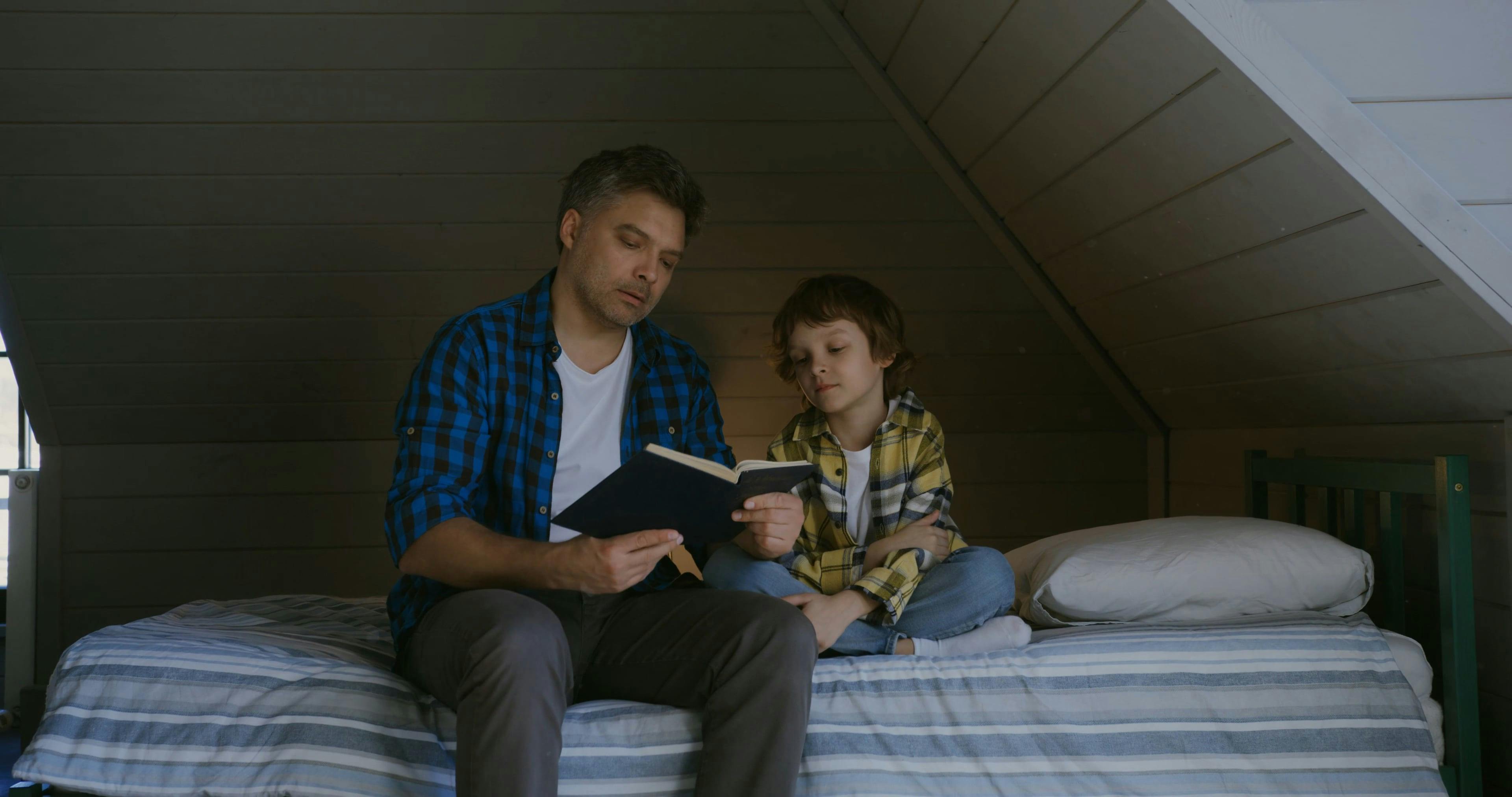 A Father Reading a Book with His Son Free Stock Video Footage, Royalty ...