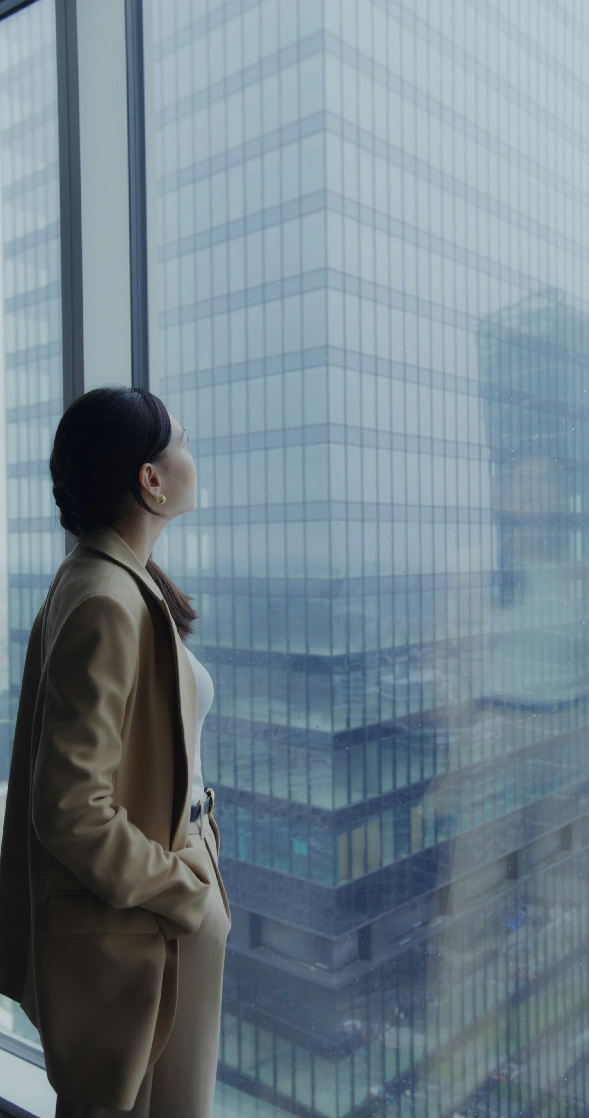 A Woman Looking Outside Office Window Free Stock Video Footage, Royalty ...